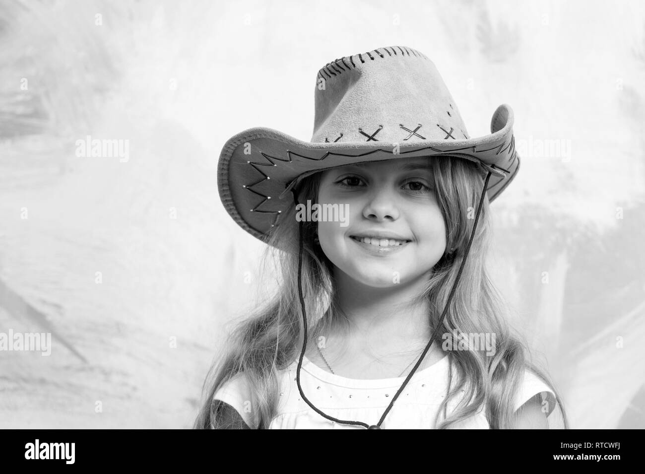 cowgirl. little girl in cowboy hat on colorful background, copy space ...