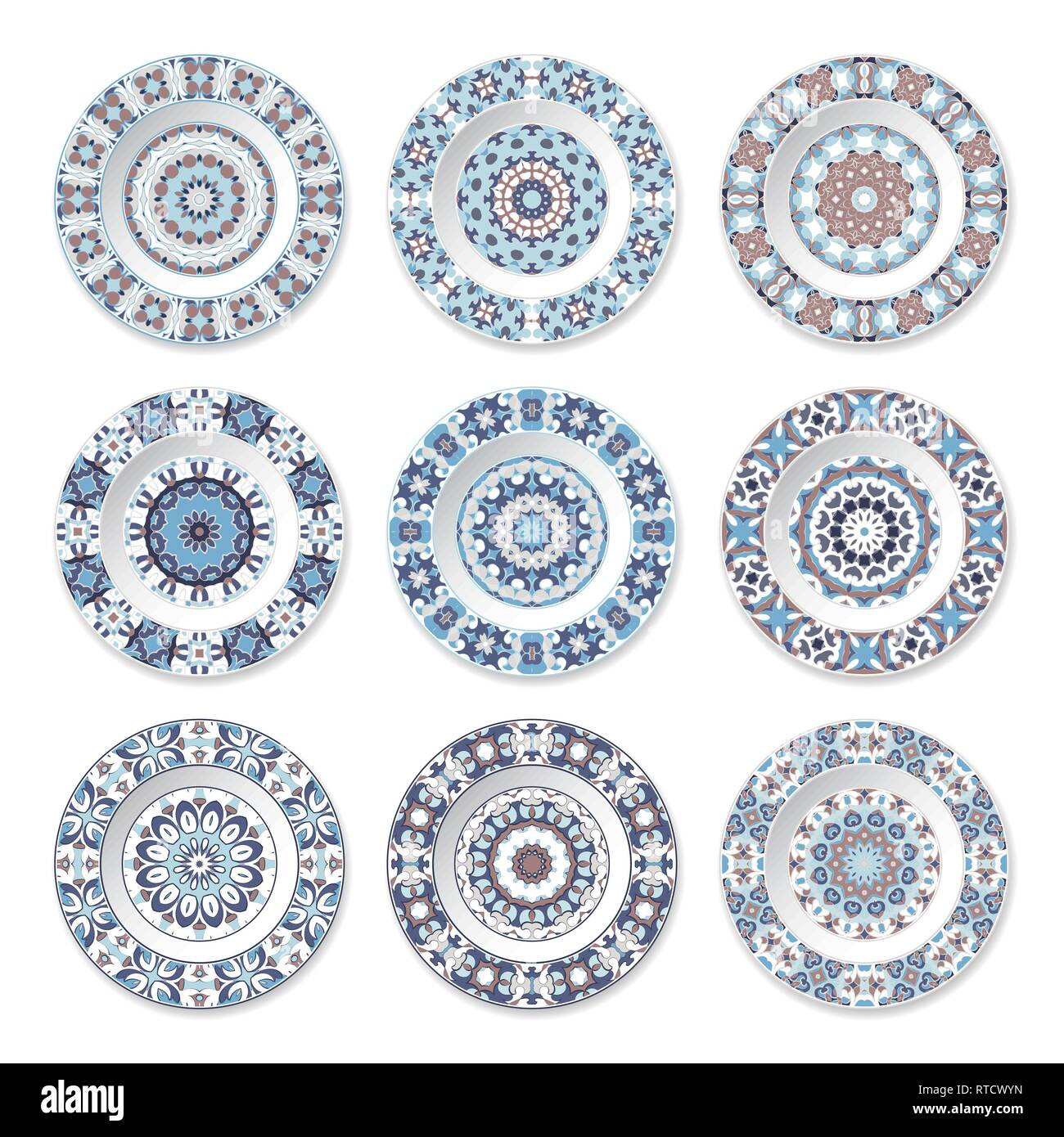 Set of decorative plates with a circular blue pattern, top view. White ...