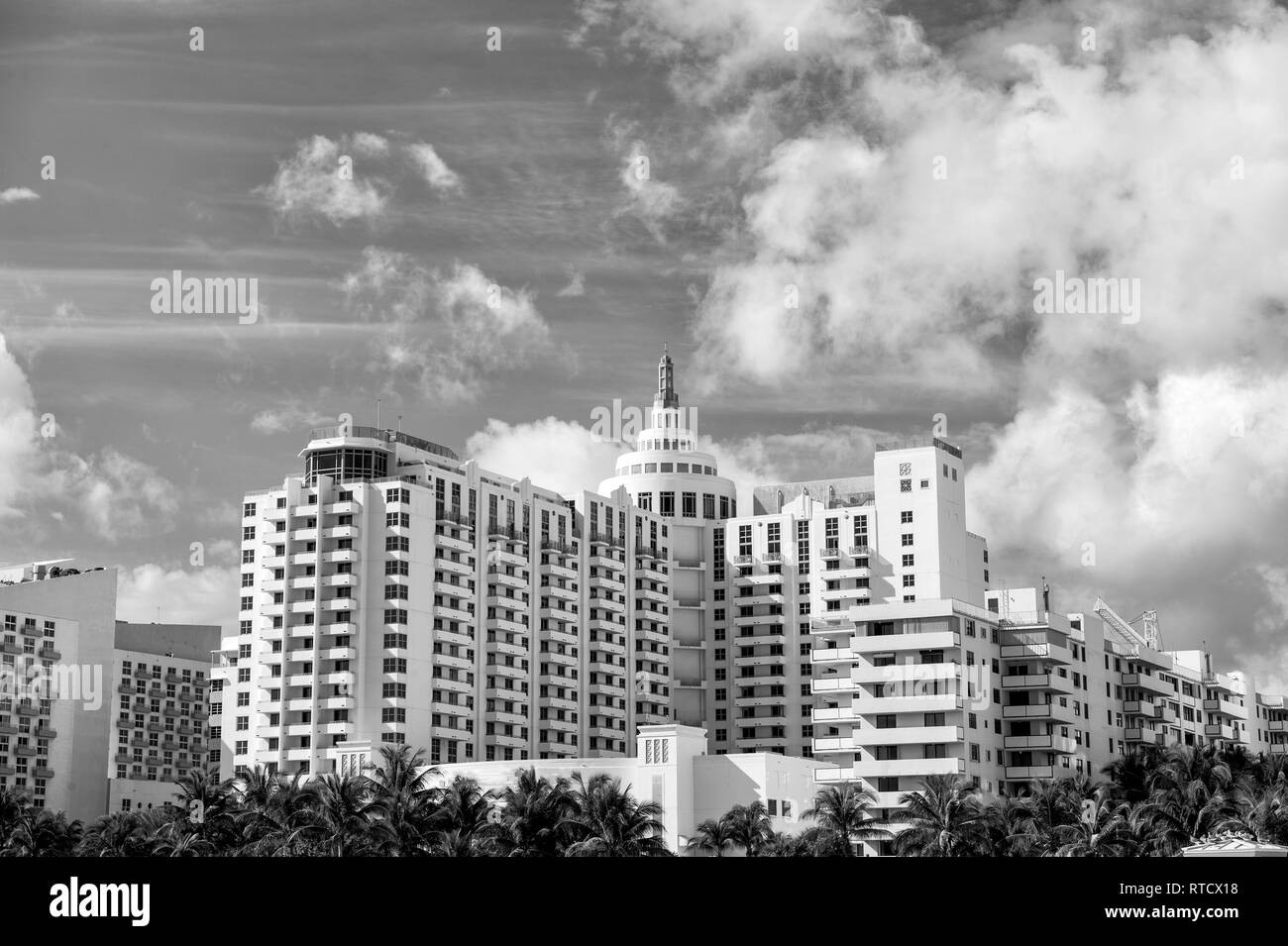 Miami, south beach. houses, apartment buildings with green palm trees ...