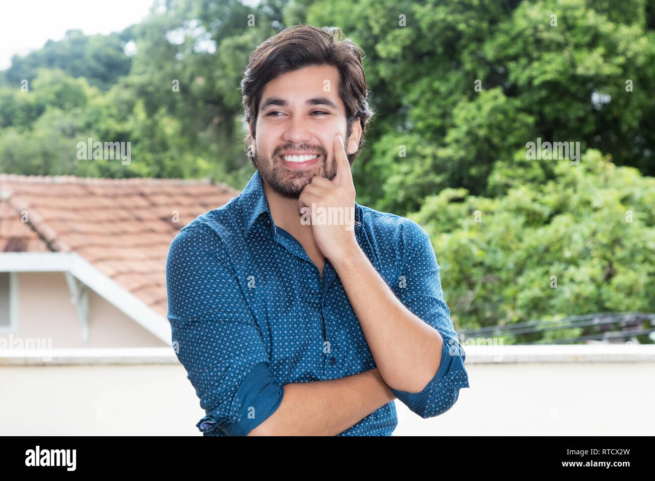 Handsome hispanic man face hi-res stock photography and images - Alamy