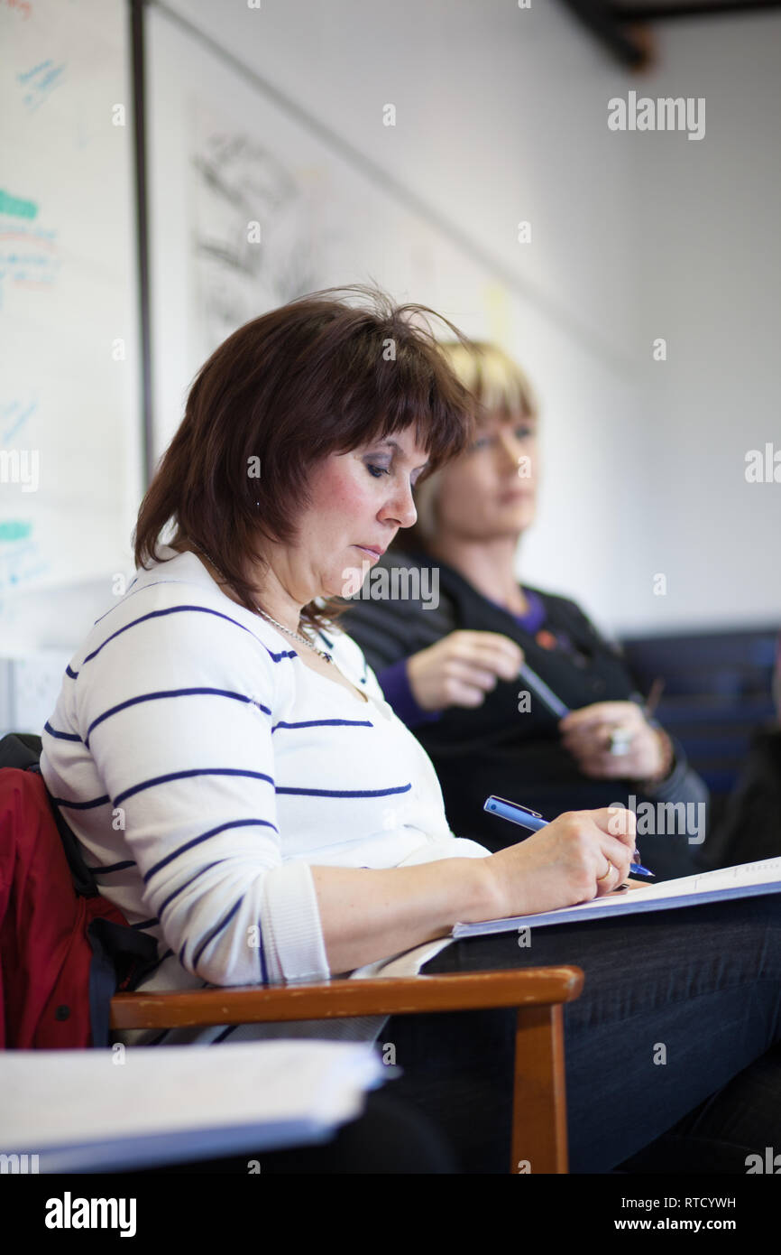 students at a college studying counselling Stock Photo - Alamy
