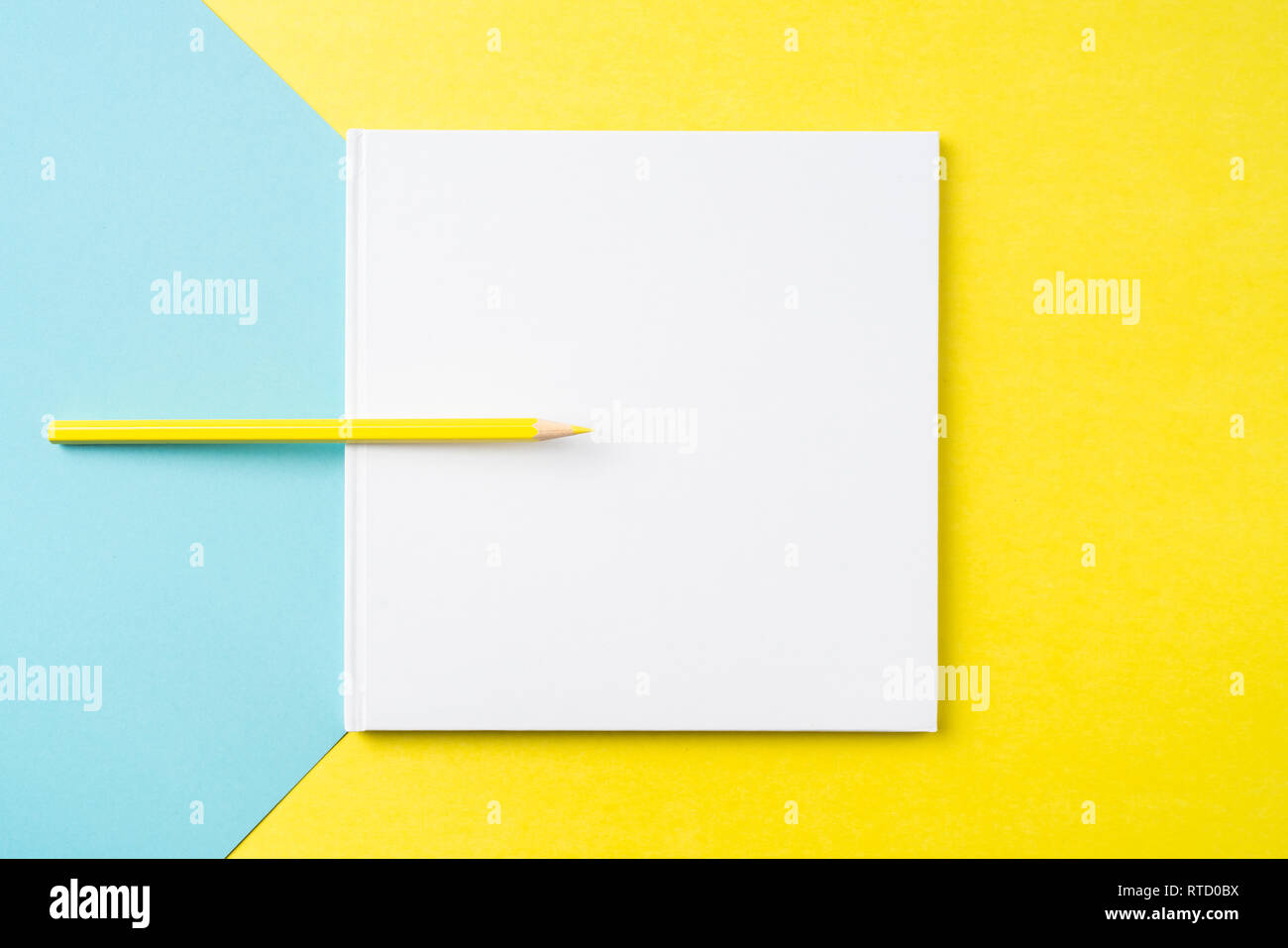Design concept - Top view of square white notebook and pen on colorful ...