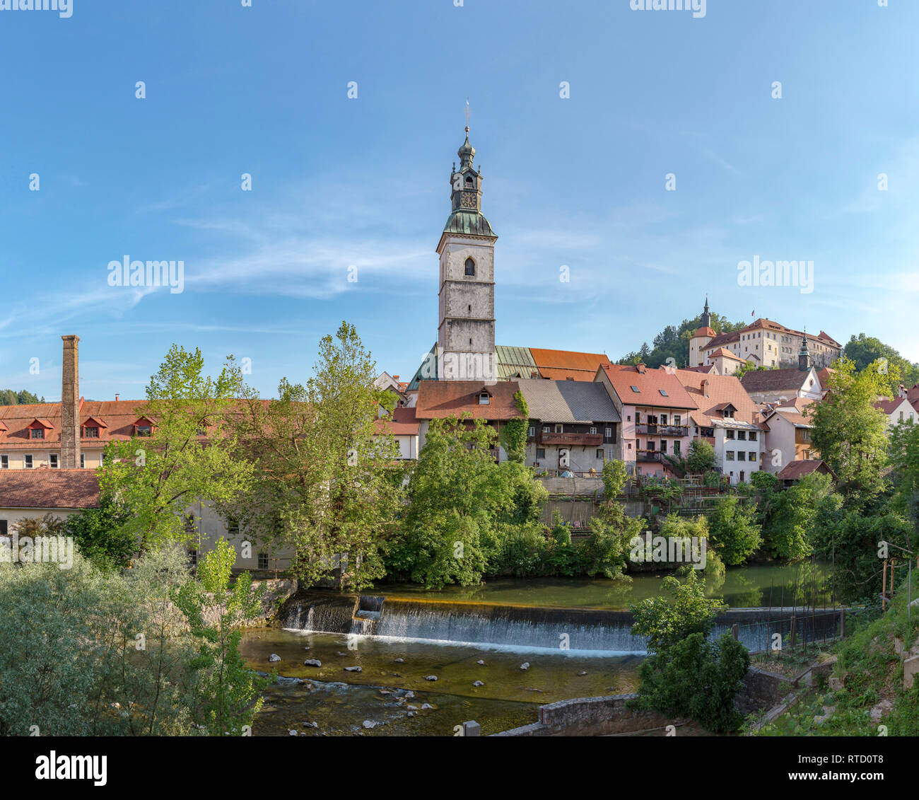 Houses, a church and a castle at the bank of the river Selska Sora ...