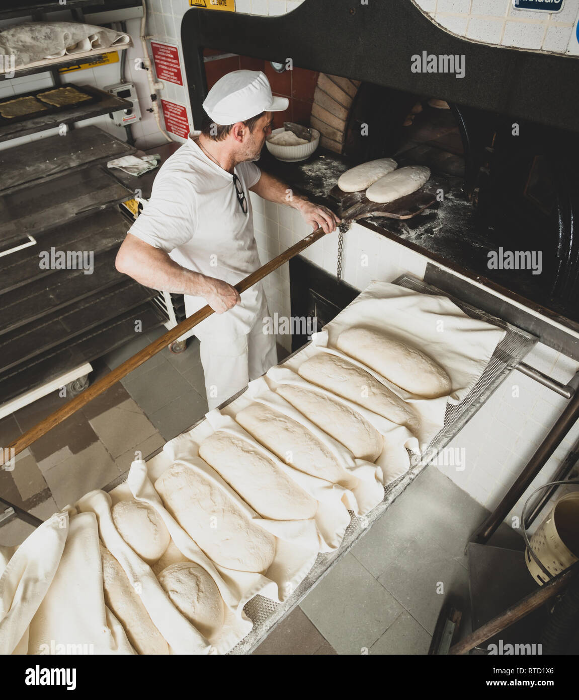 Daily production of bread baked with wood oven with traditional method ...