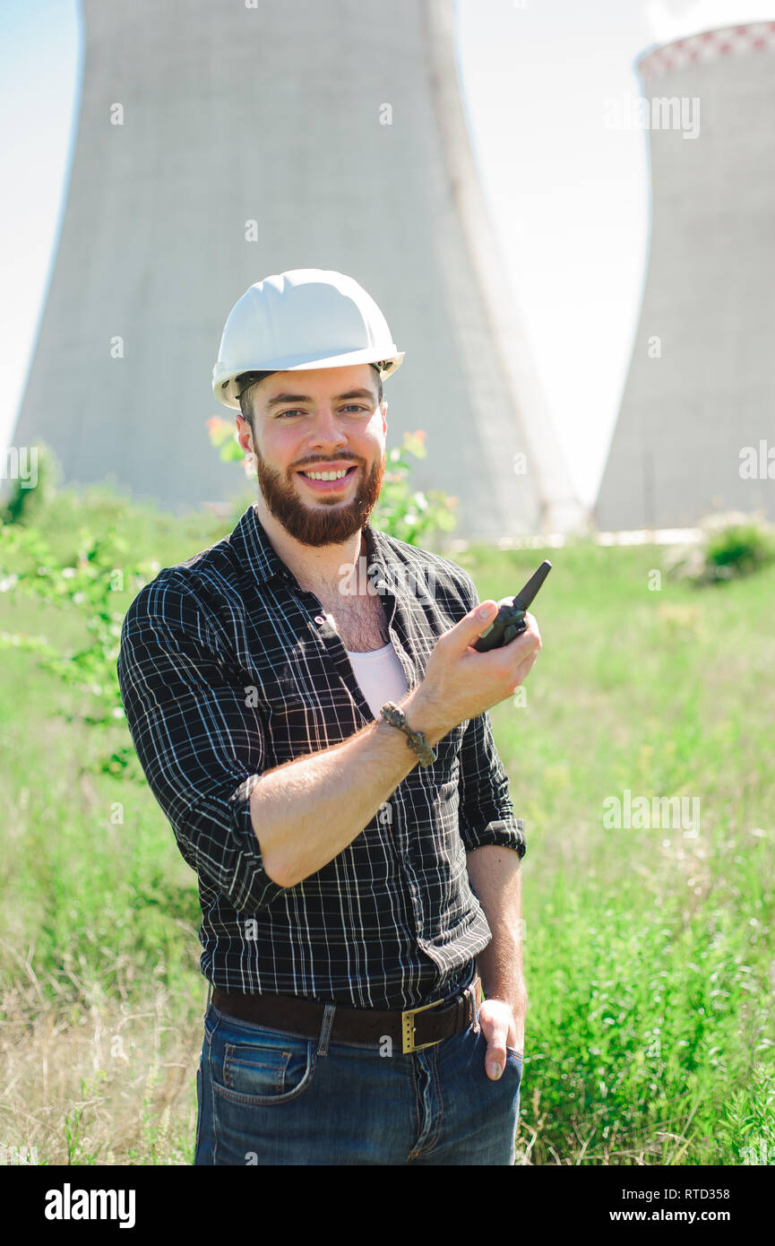The engineer works at a power plant or electrical station Stock Photo ...