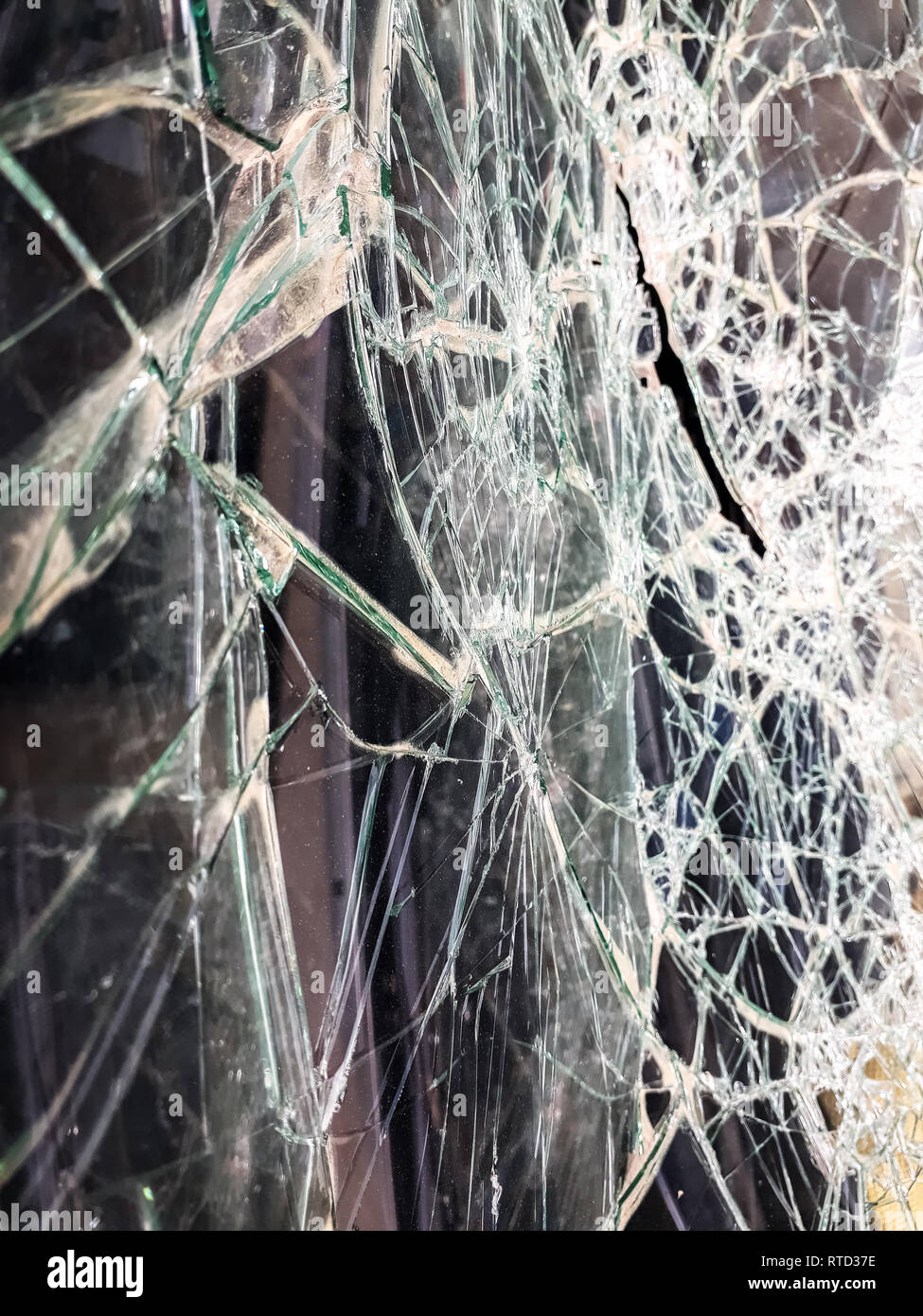 Car windshield shattered with stones by vandals Stock Photo - Alamy