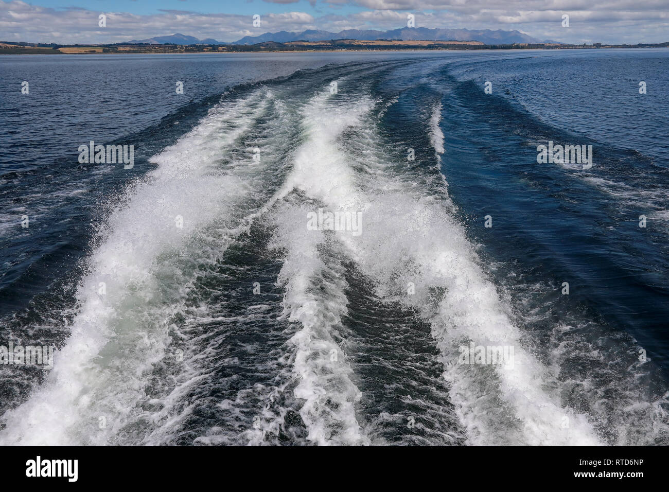 Catamaran wake pattern at full speed on Lake Te Anau, Southlands, New ...