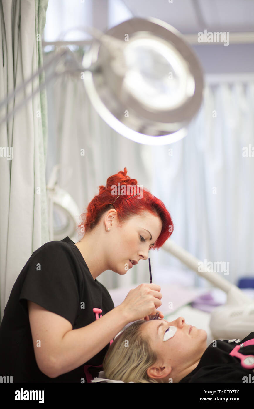 adults in a further education college studying beauty Stock Photo - Alamy