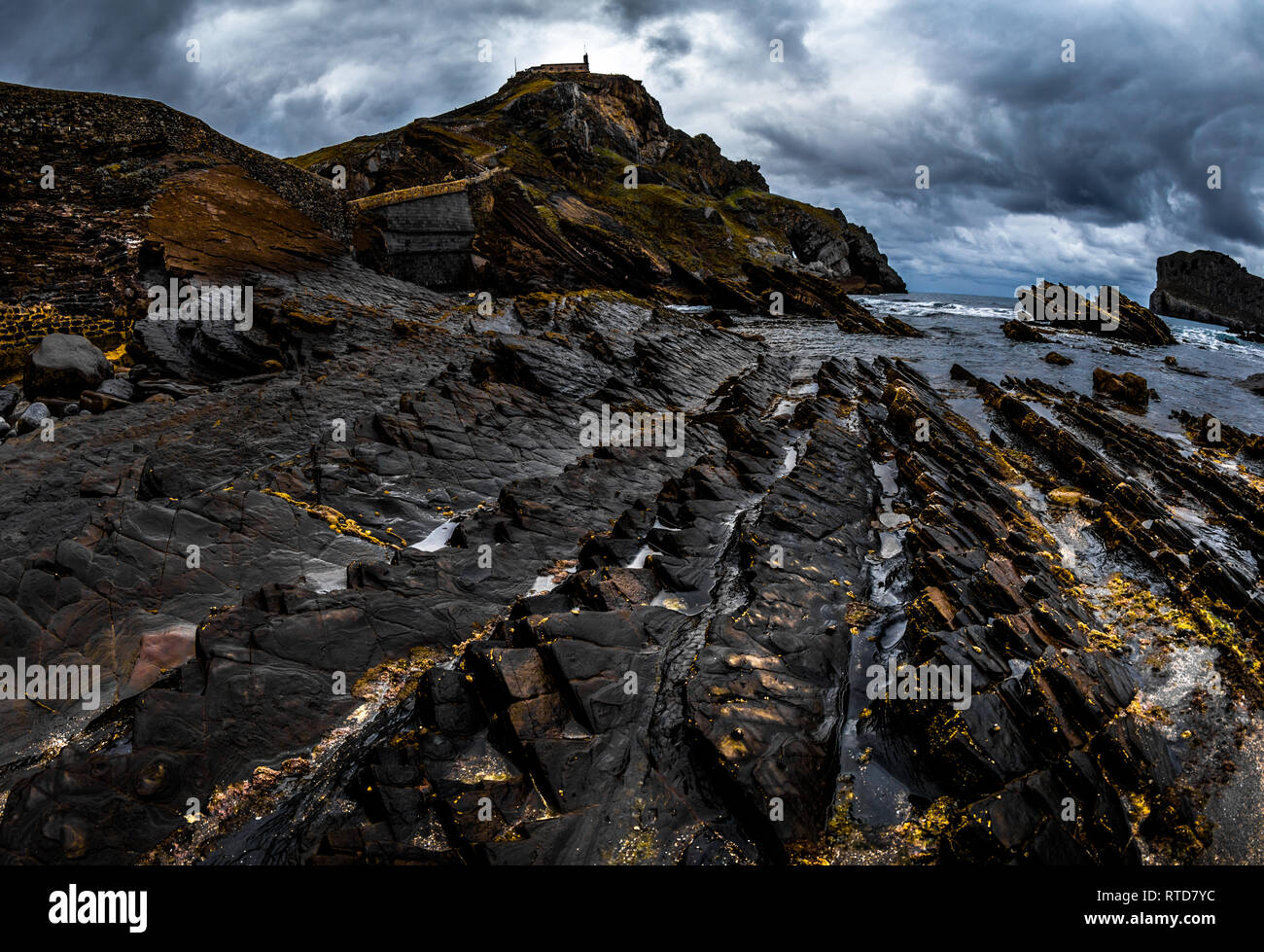 Gaztelugatxe on Bay of Biscay, the Spanish Basque Coast. A craggy islet ...