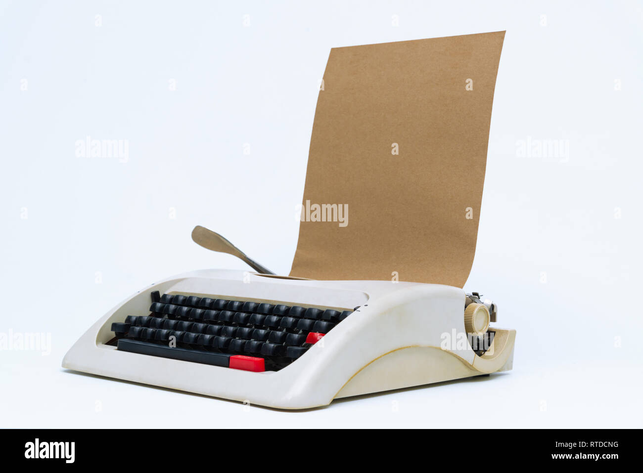 Retro typewriter with blank paper sheet on white background Stock Photo ...