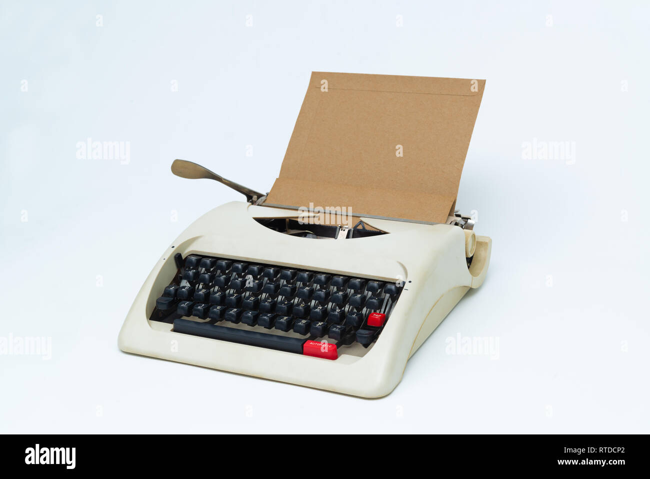 Retro typewriter with blank paper sheet on white background Stock Photo ...