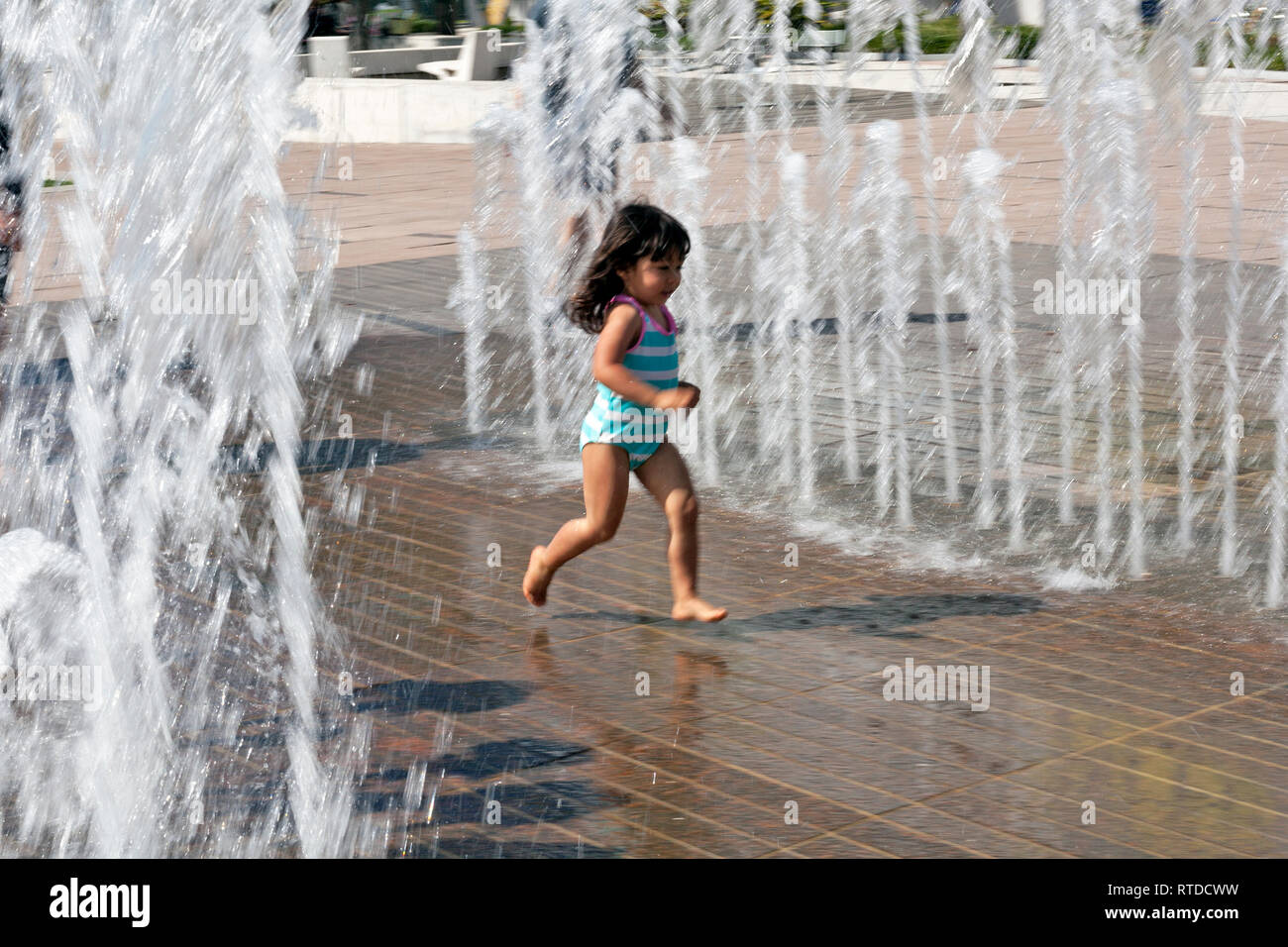 Girl water park splash pad hi-res stock photography and images - Alamy