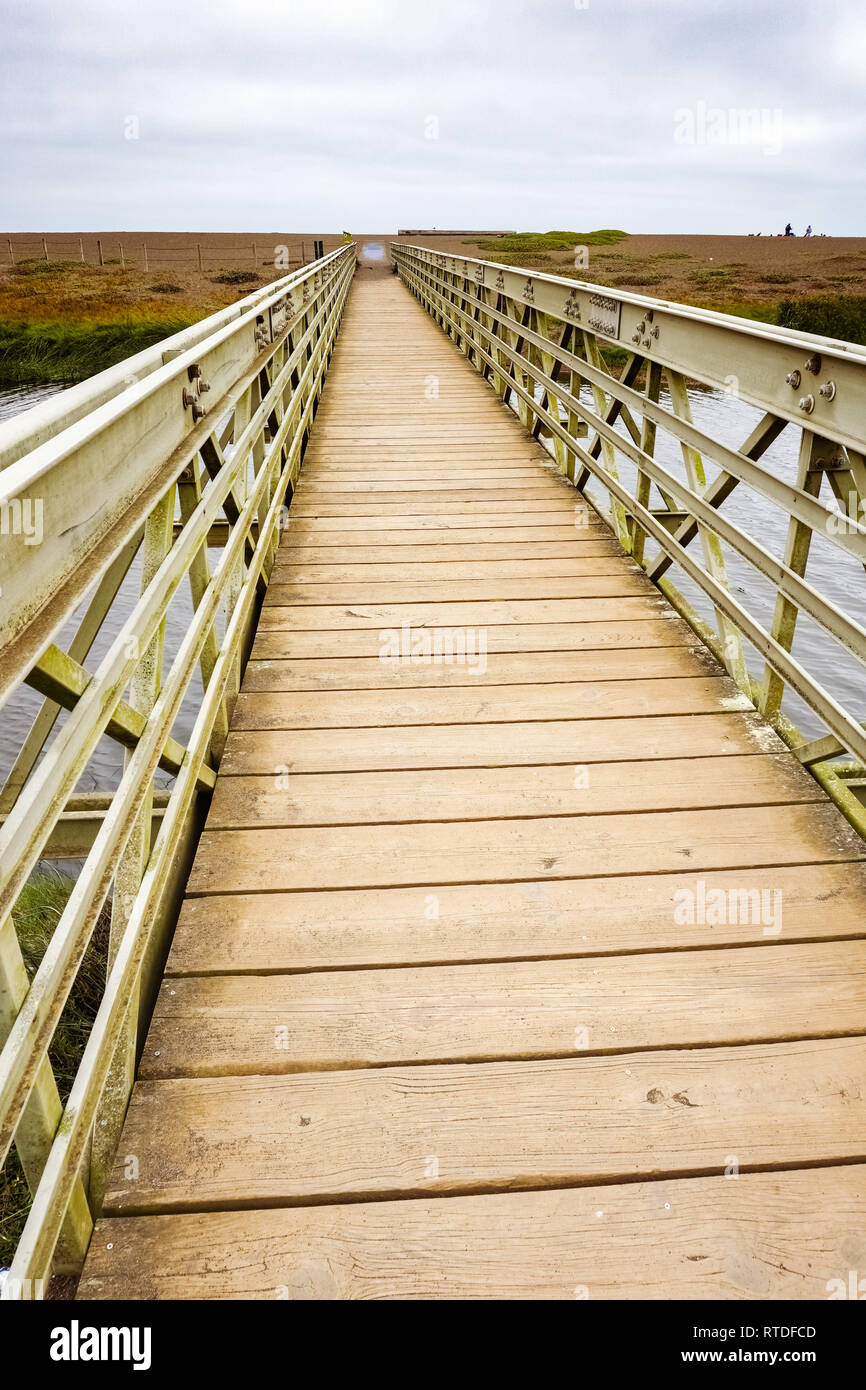 Wood and metal bridge crossing the Rodeo Lagoon towards Rodeo Beach ...