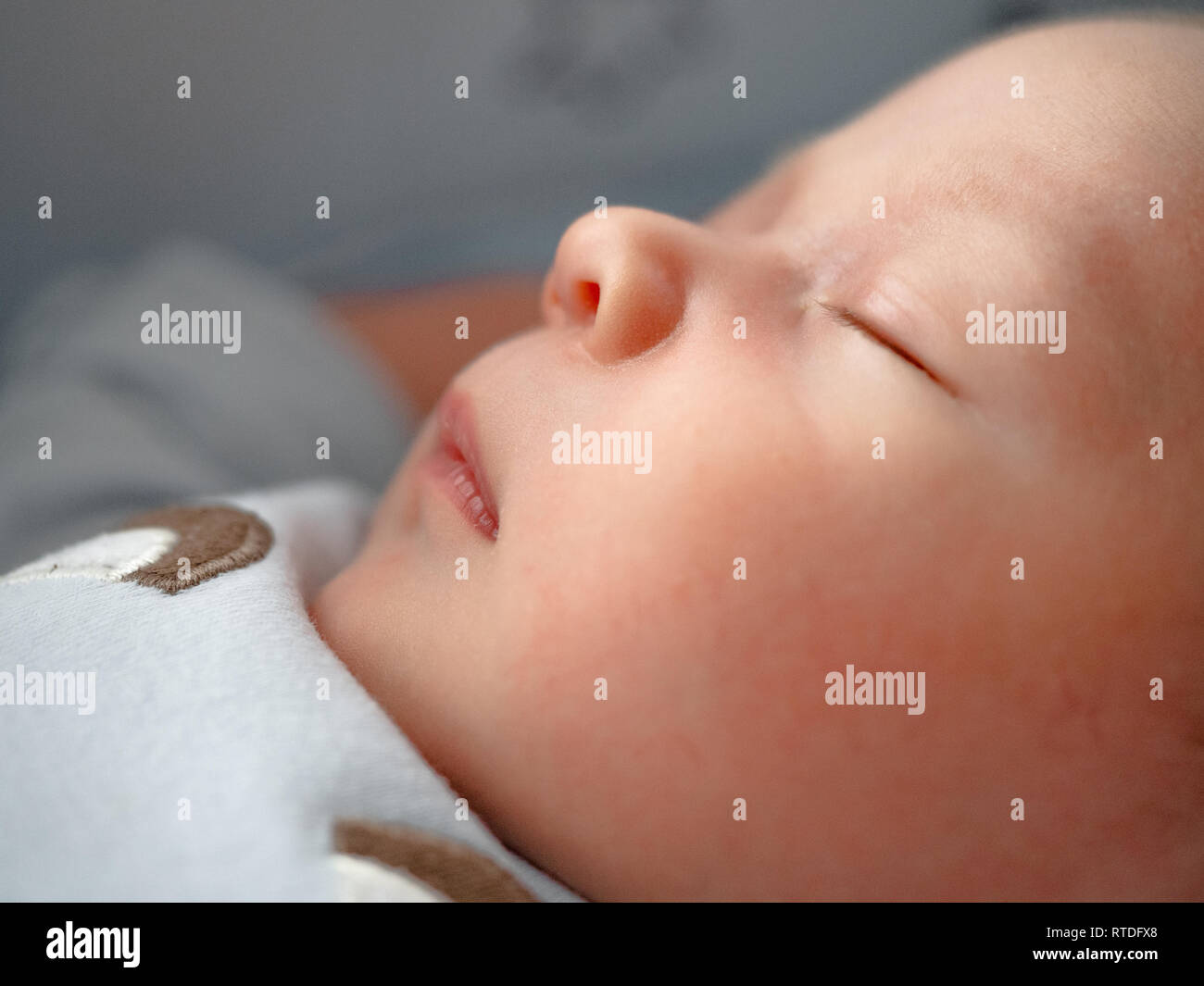 Close-up portrait cute little mixed race Asian and Caucasian baby son ...