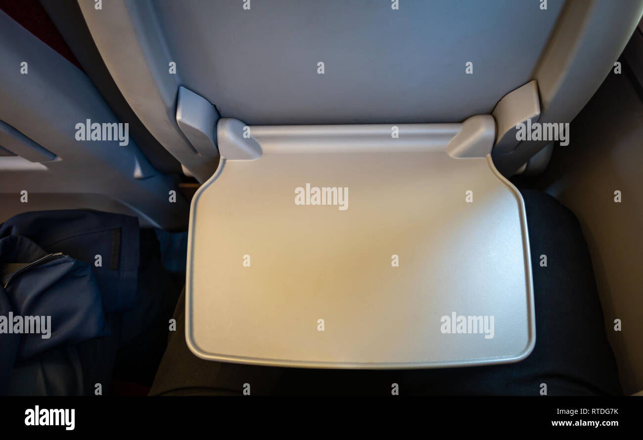 Passengers view of fold down seating table tray on a british railway ...