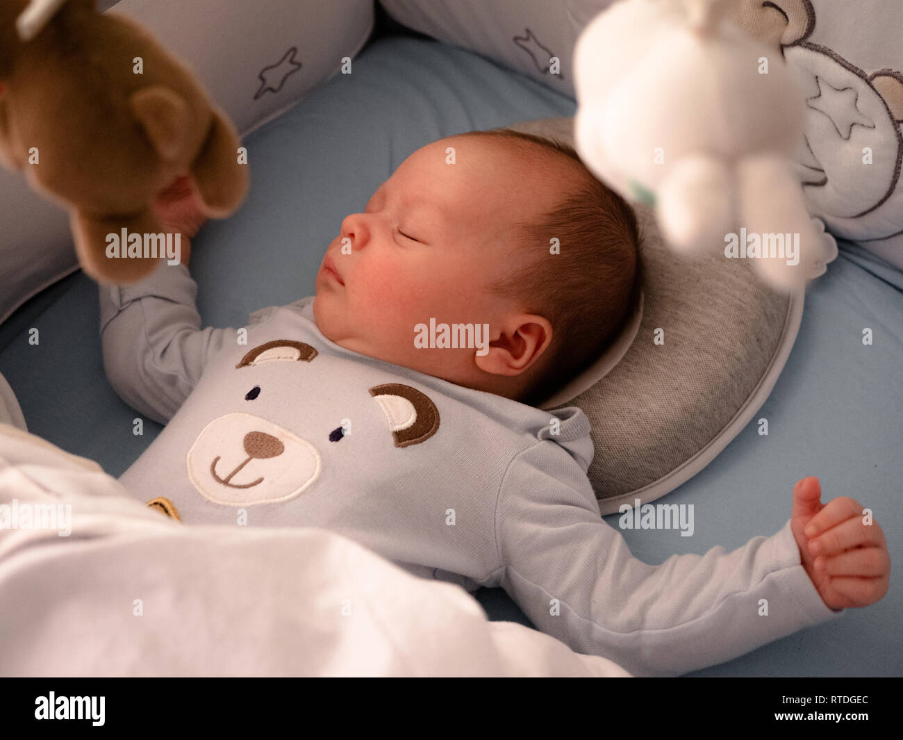 Close-up portrait cute little mixed race Asian and Caucasian baby son ...