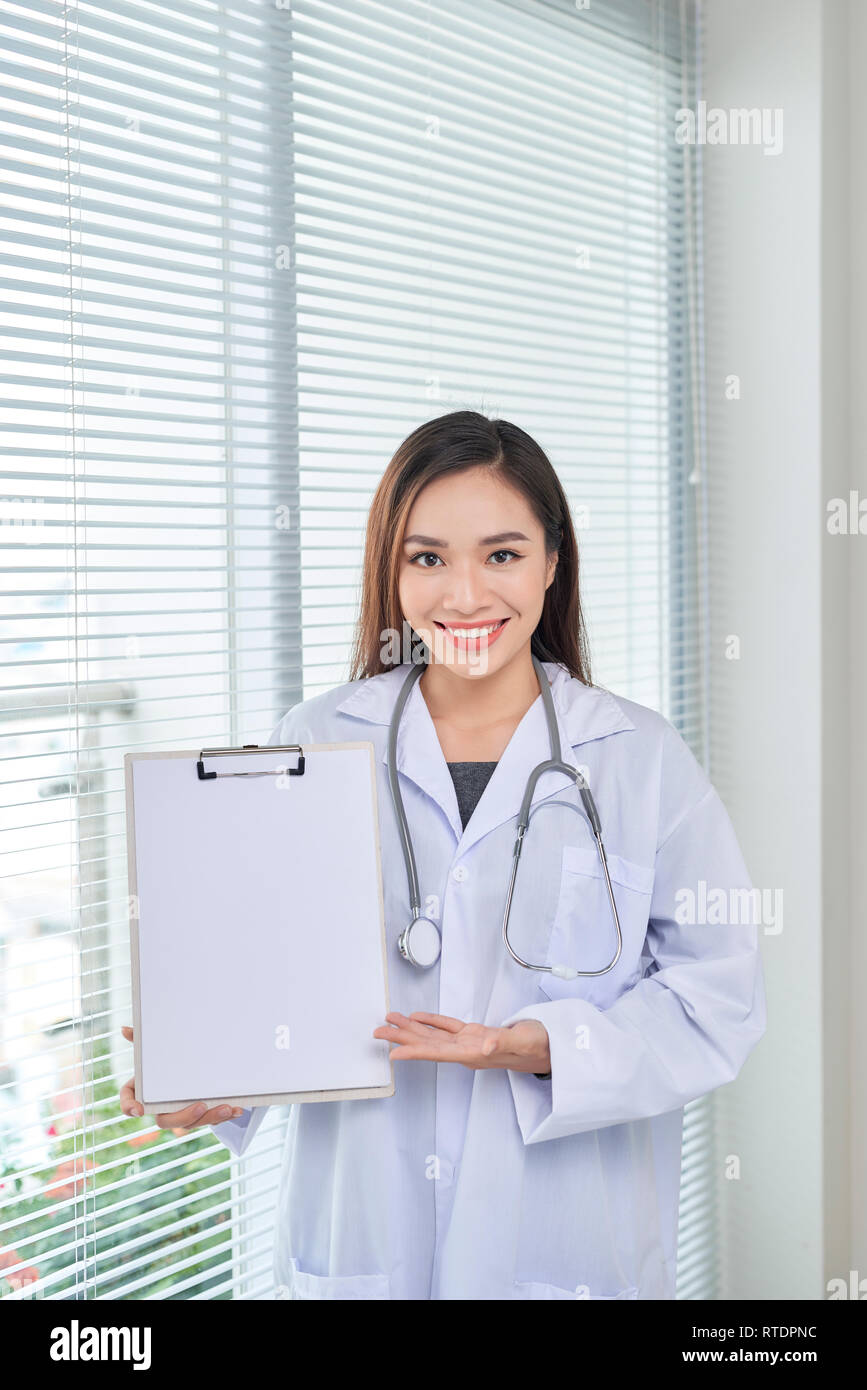 concerned medical doctor with stethoscope showing on empty blank Stock ...