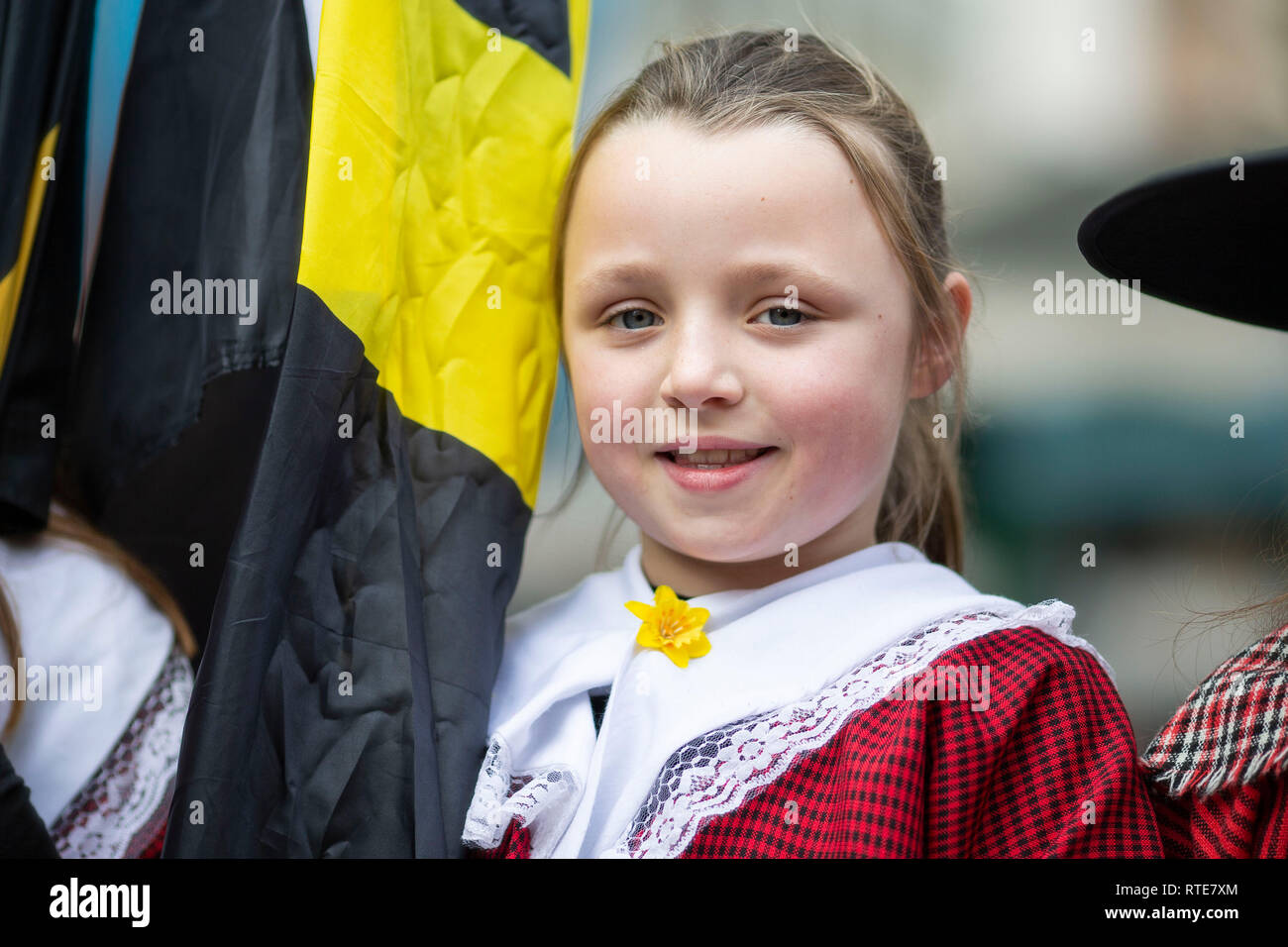 Cardiff, Wales, UK. March 1st 2019. A girl in traditional Welsh dress ...