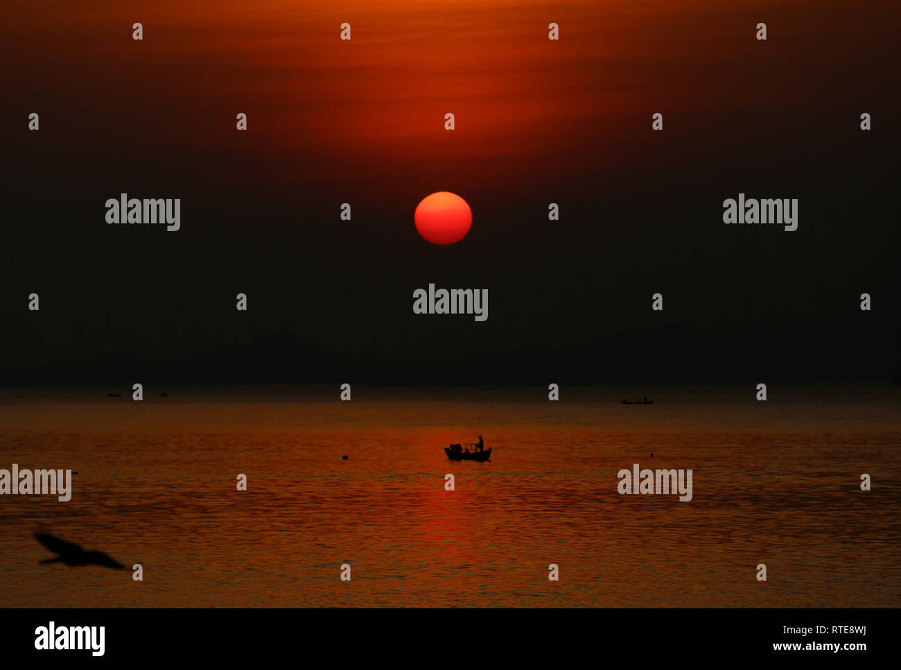 Mawlamyine, Myanmar. 1st Mar, 2019. A fishing boat floats on Thanlwin ...
