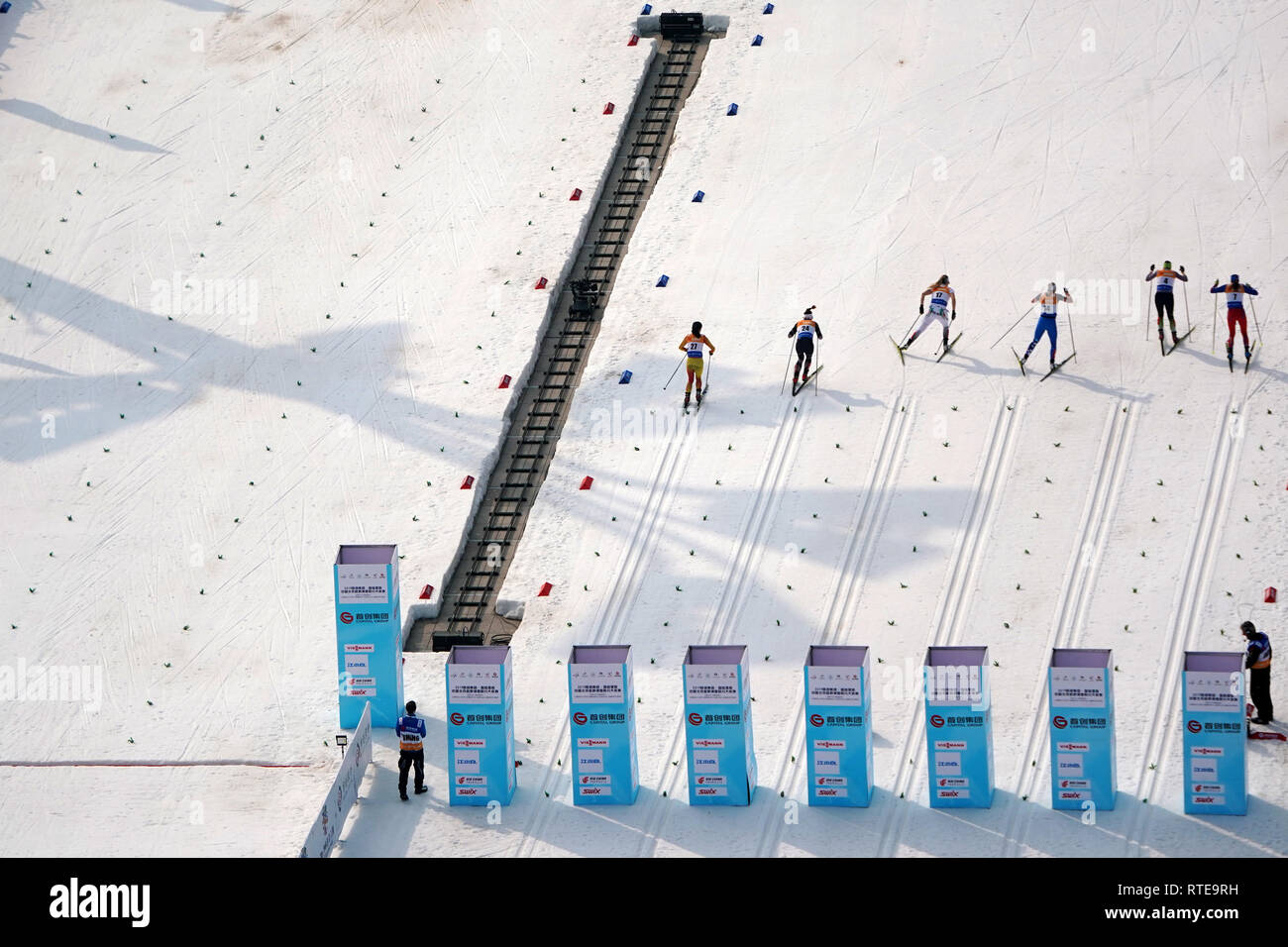 Beijing, China. 1st Mar, 2019. Players compete during the FIS-CC Skiing ...