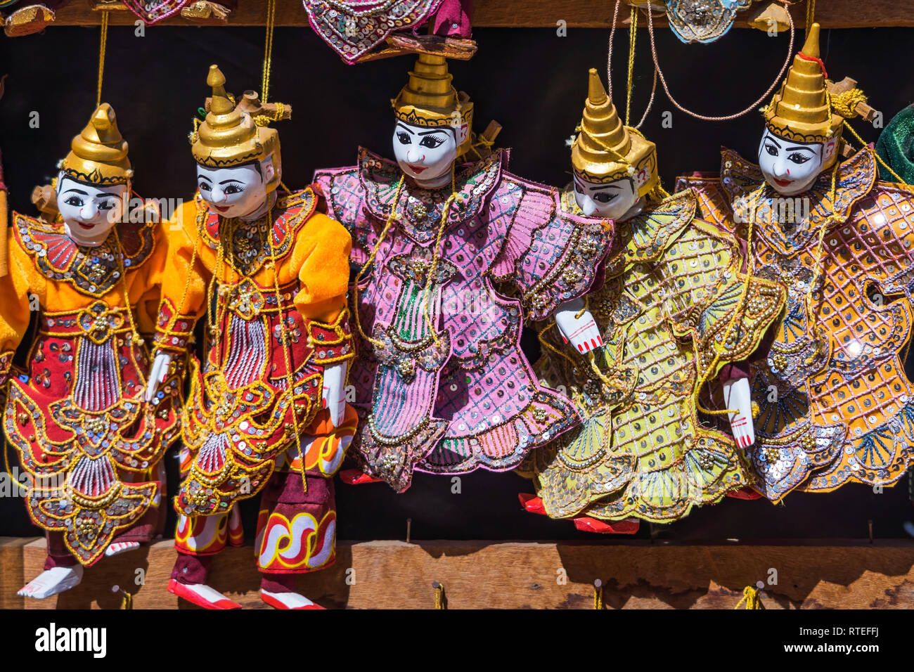 Traditional handicraft puppets for sale in the ancient pagoda in Bagan ...