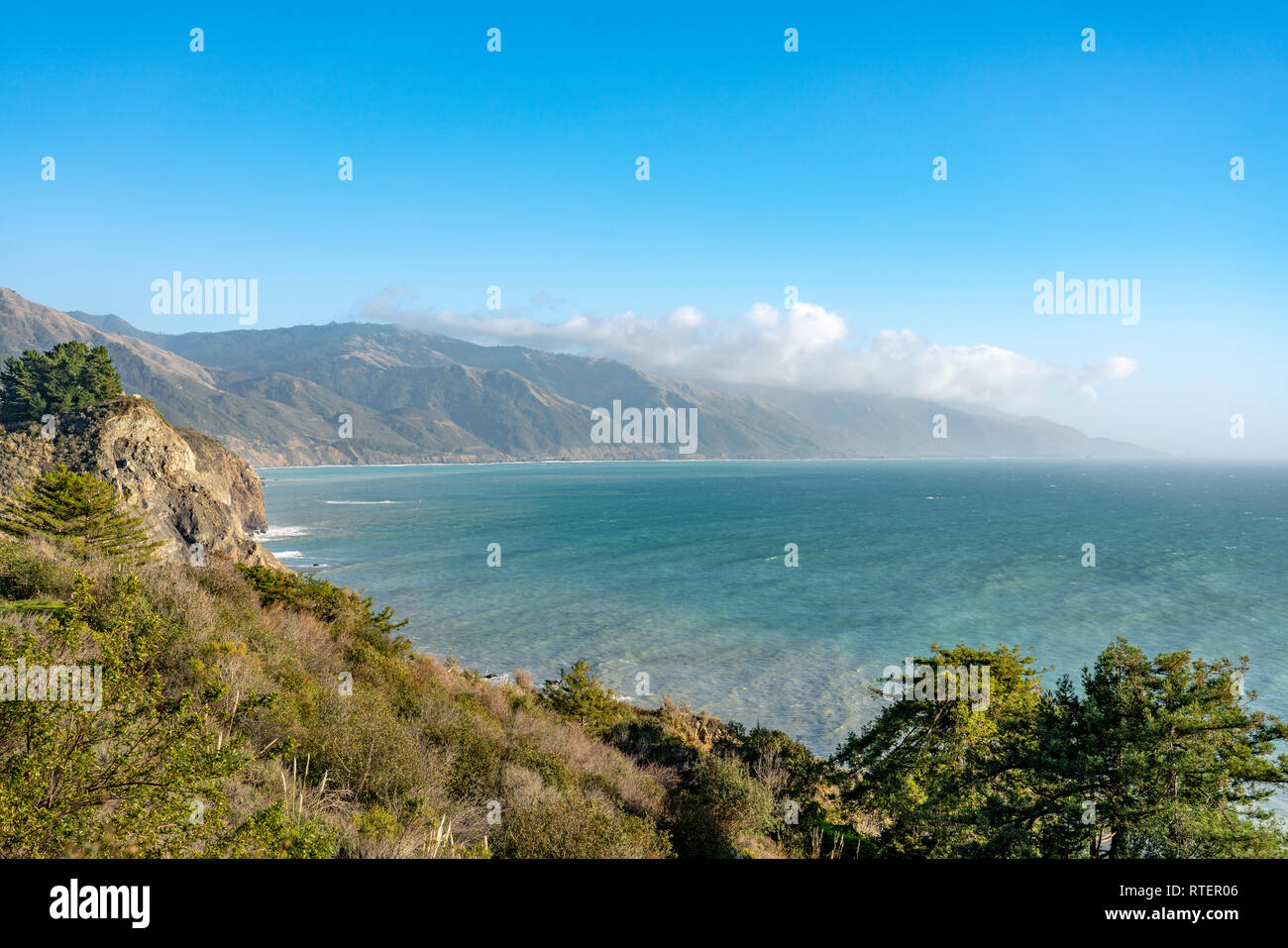 Wide view of the Big Sur coastline along highway one in California ...