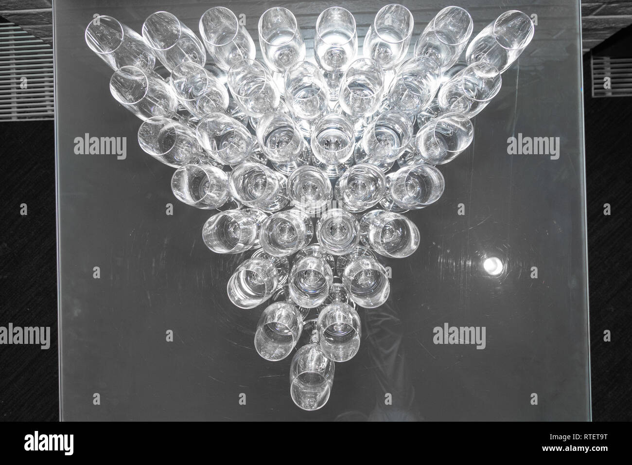 Close-up Triangle of empty wine glasses top view Stock Photo - Alamy