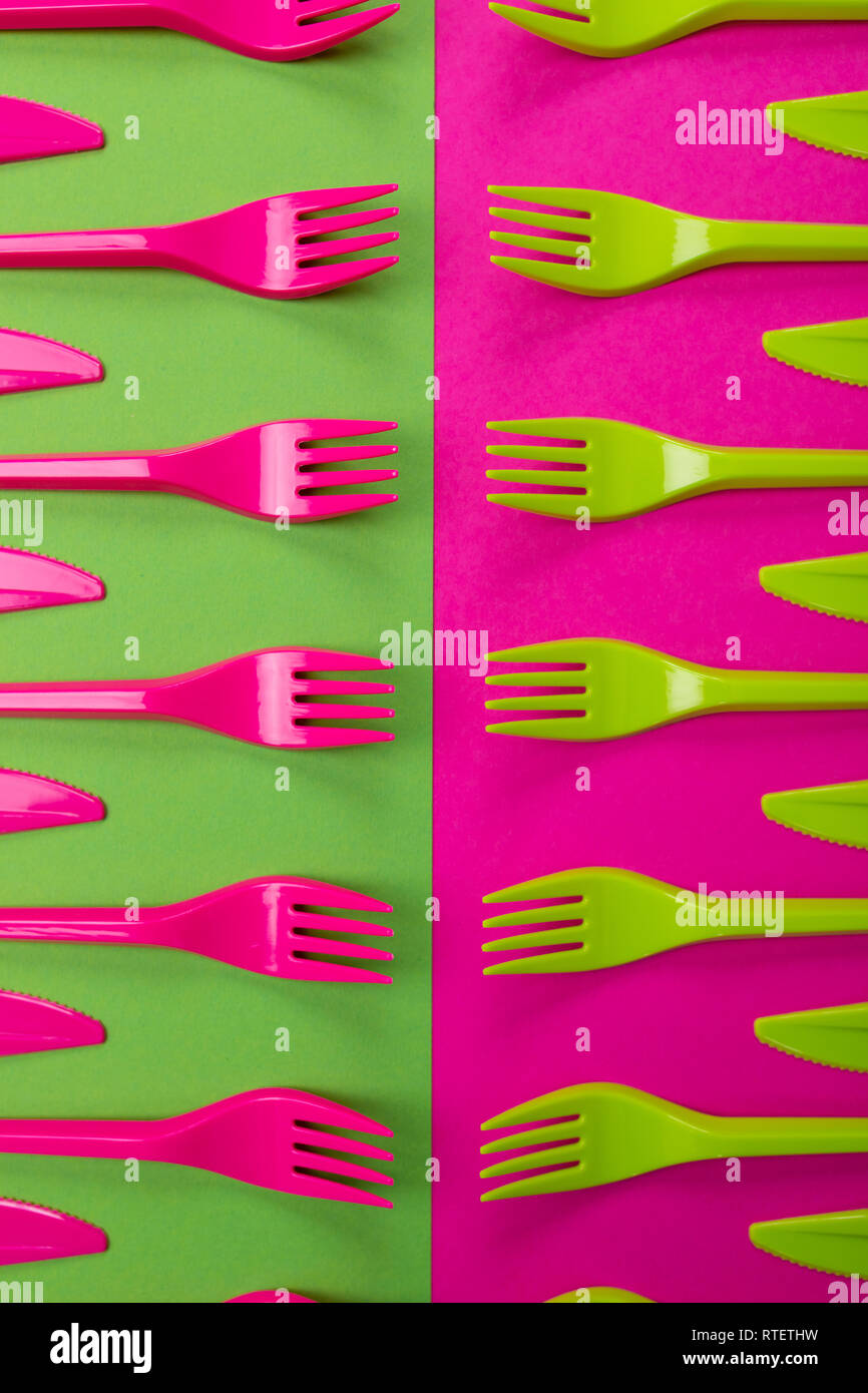 Colorful set of plastic table ware isolated on background Stock Photo ...