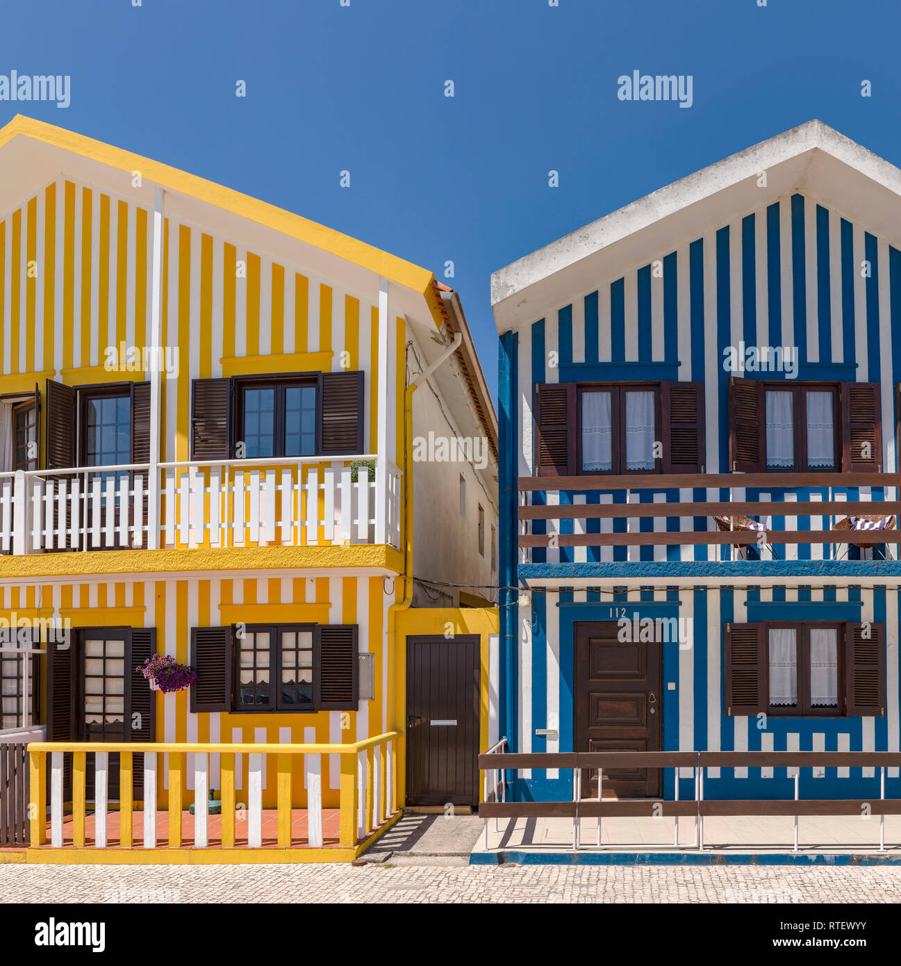 Typical bold coloured houses, Costa Nova, Aveiro, Portugal Stock Photo ...