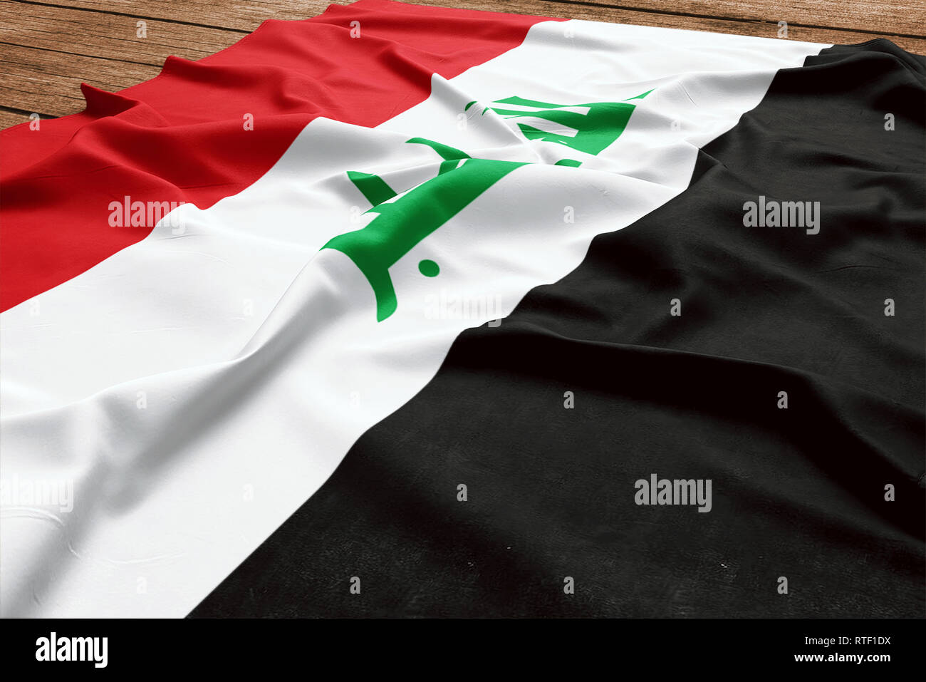 Flag of Iraq on a wooden desk background. Silk Iraqi flag top view ...