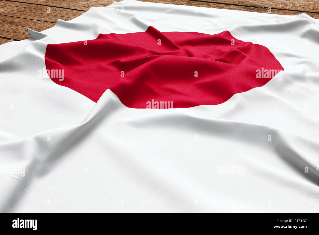 Flag of Japan on a wooden desk background. Silk Japanese flag top view ...