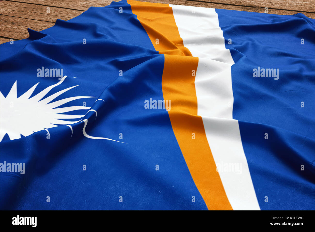 Flag of Marshall Islands on a wooden desk background. Silk Marshallese ...