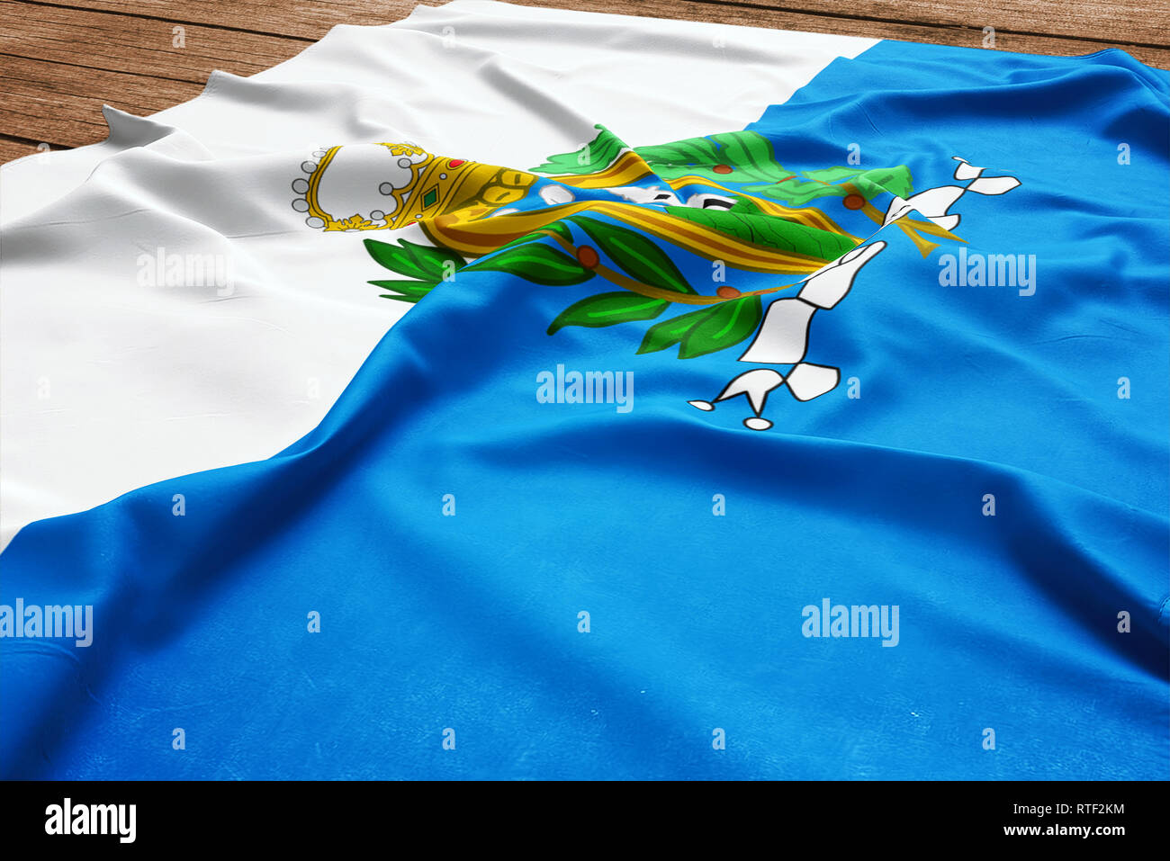 Flag of San Marino on a wooden desk background. Silk Sammarinese flag ...