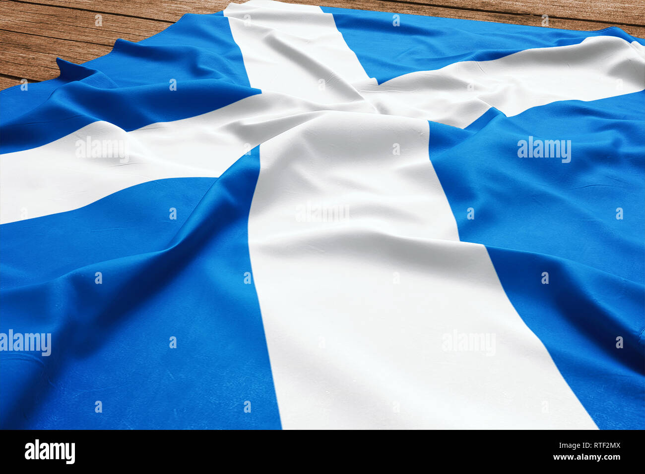 Flag of Scotland on a wooden desk background. Silk Scottish flag top ...