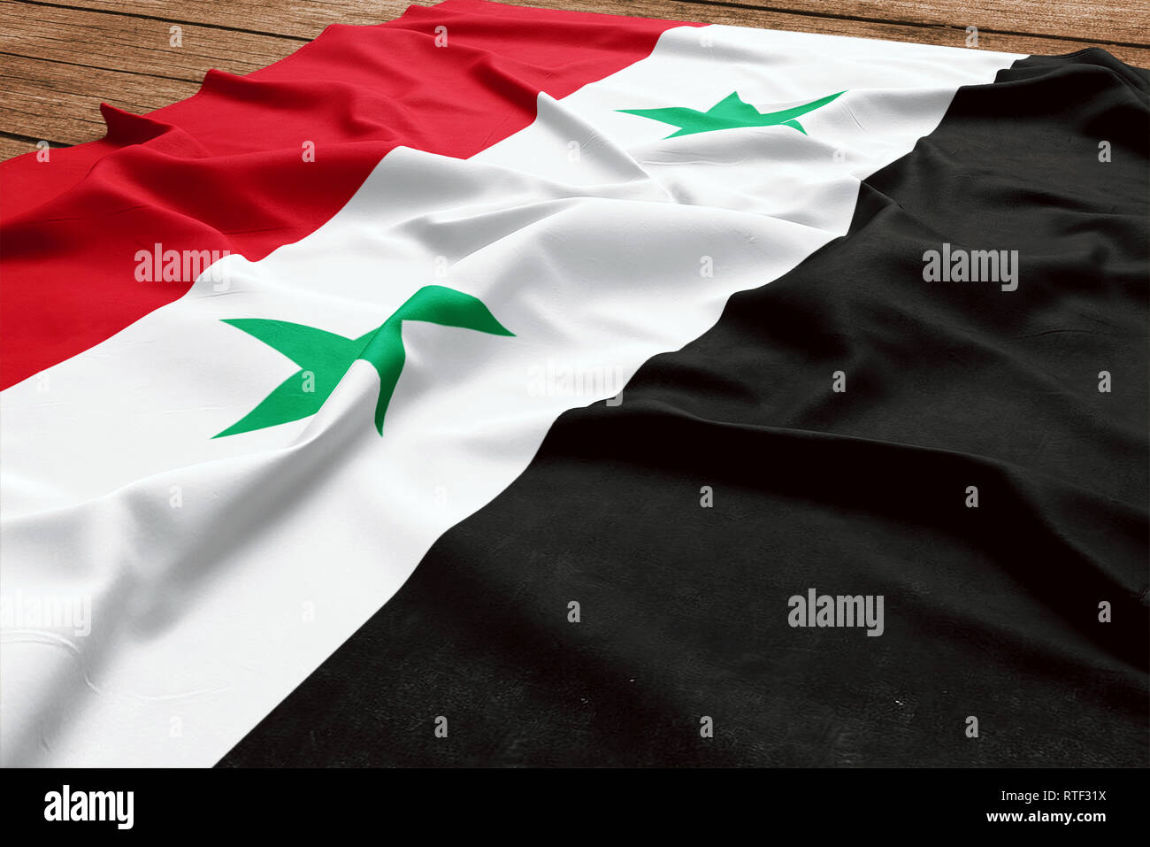 Flag of Syria on a wooden desk background. Silk Syrian flag top view ...