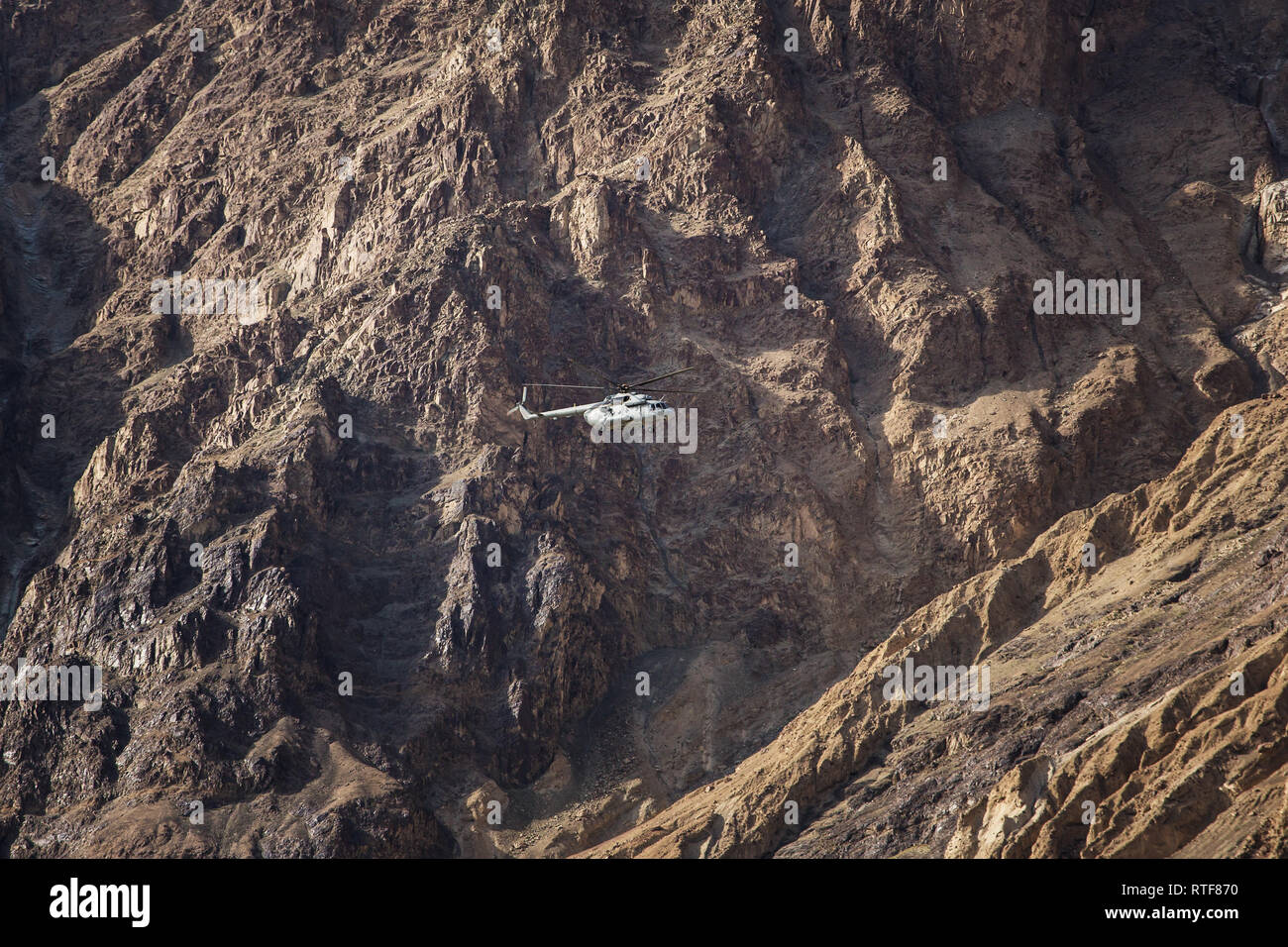 Helicopter flying over Himalaya range in Ladakh, India Stock Photo - Alamy