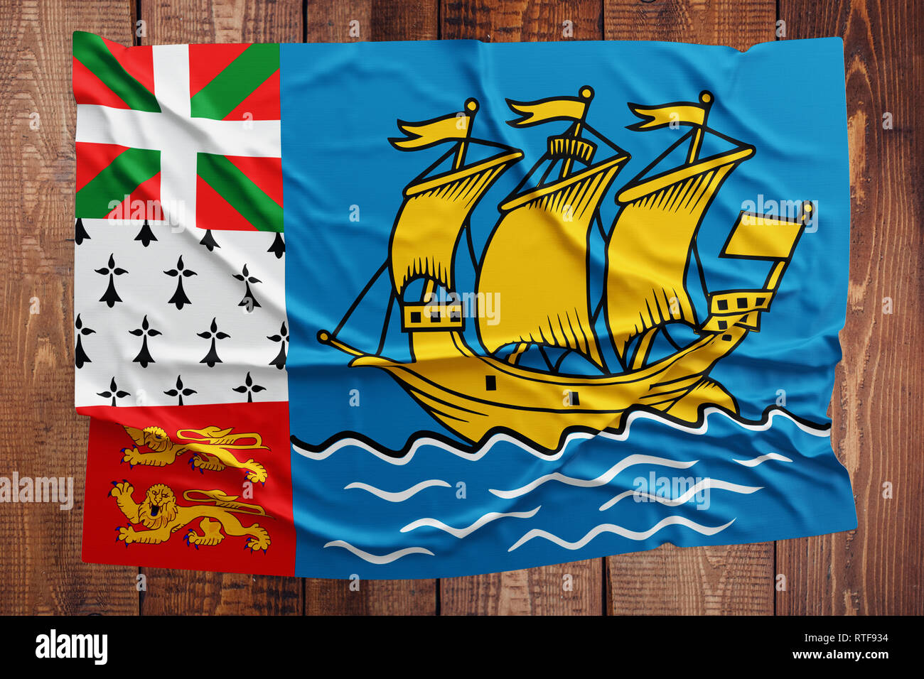 Flag of Saint Pierre And Miquelon on a wooden table background ...