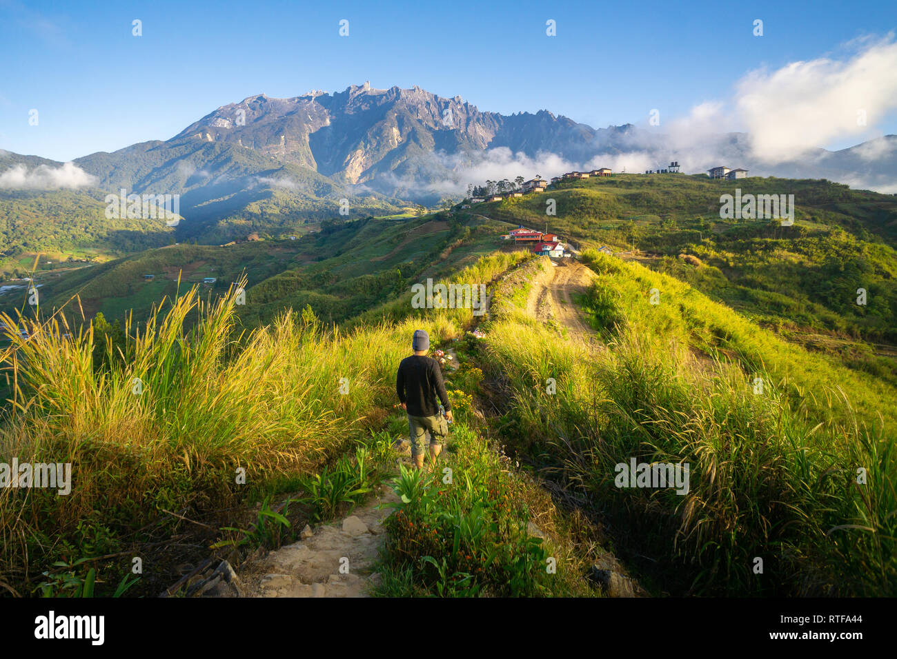 Man walking,hiking and trekking at ridge trail at beautiful morning ...