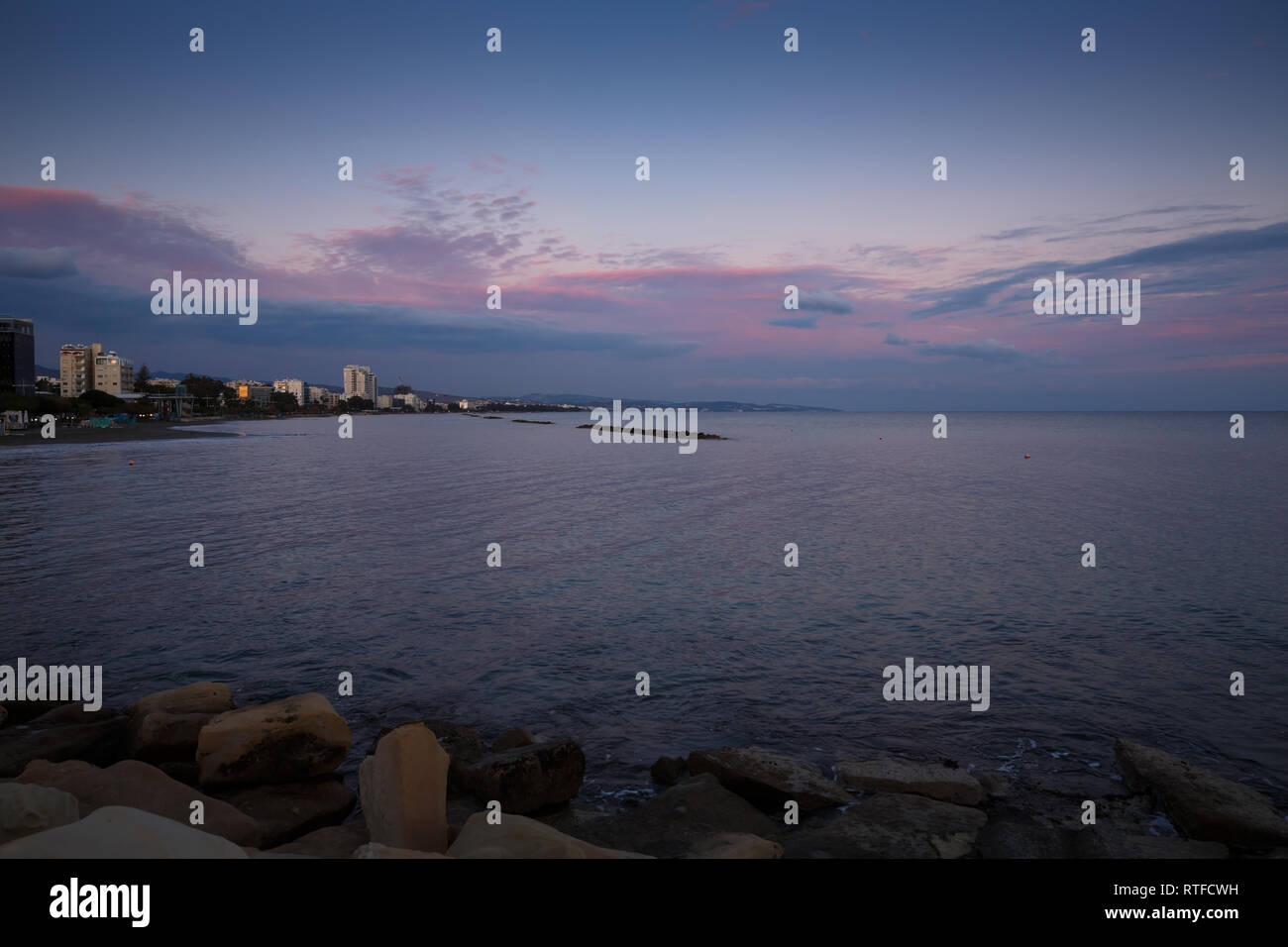 Purple sunset in Limassol city, Cyprus Stock Photo - Alamy