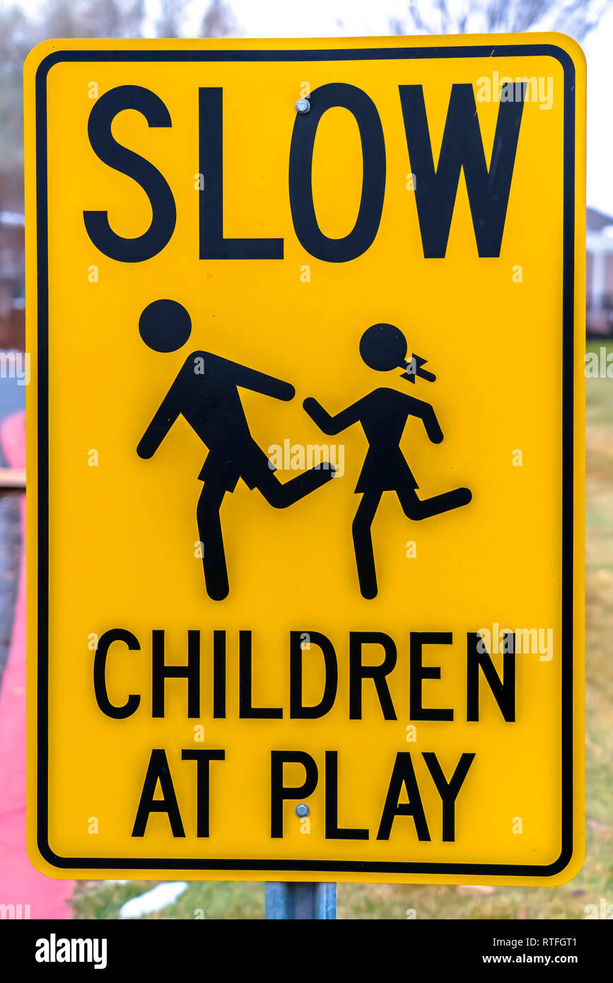 Close up view of Slow Children At Play sign. Close up view of a Slow ...