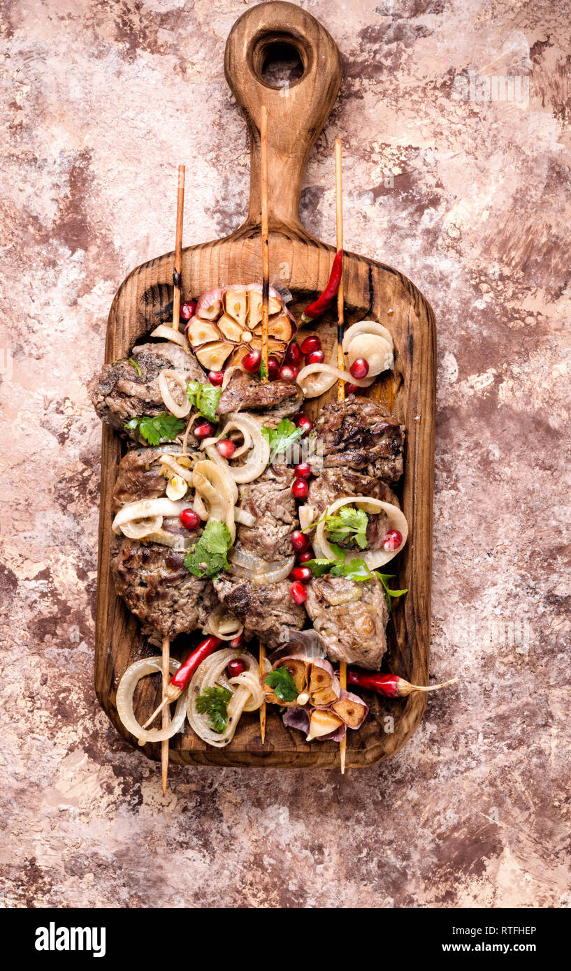 Grilled meat skewers, shish kebab.Fast food.Grilled meat and barbecue ...