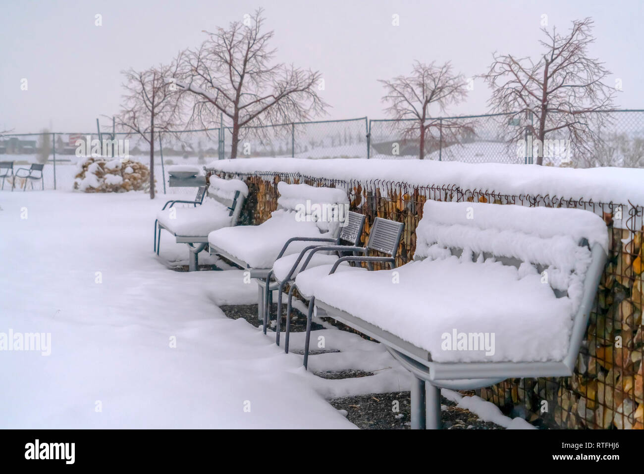 Frosty benches against a winter landscape in Utah. Empty benches ...