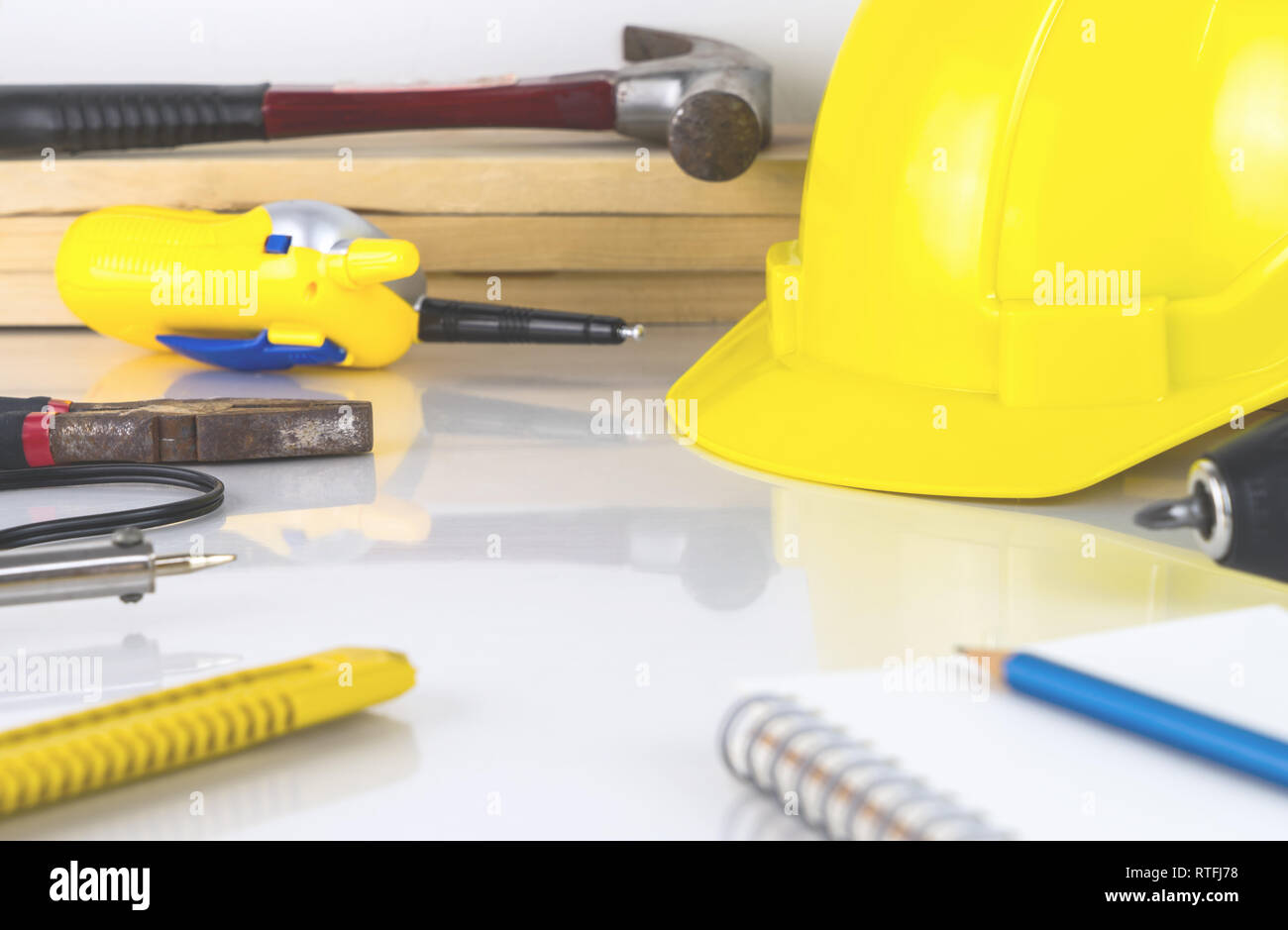 Construction engineering tools on white table Stock Photo - Alamy