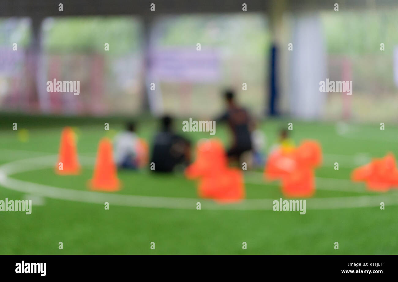 Soccer training equipments on training ground with children Stock Photo ...