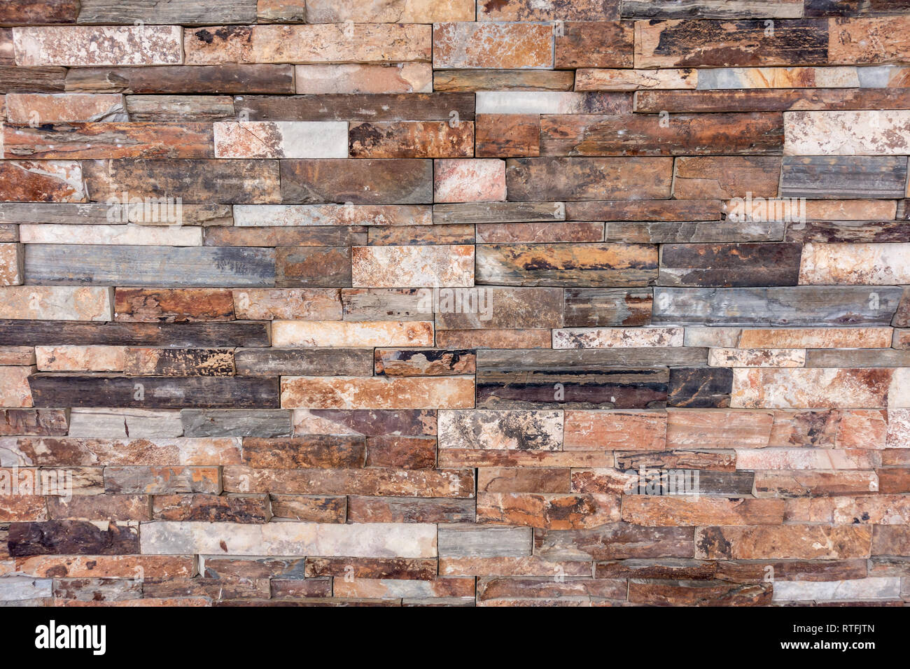 Orange Gray Rock layers wall for texture background Stock Photo - Alamy