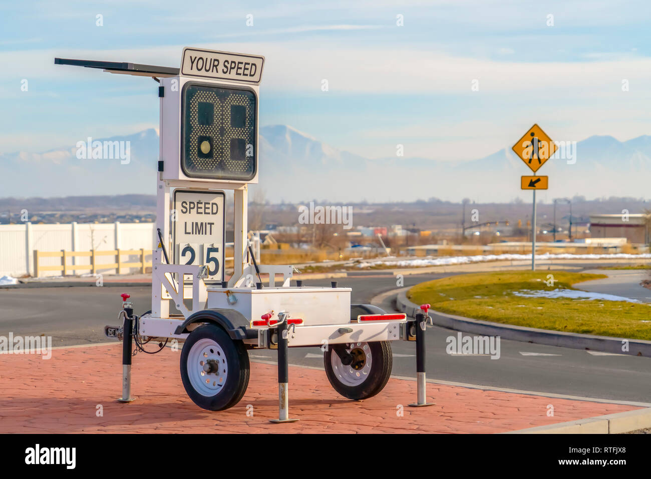 Radar speed display trailer with speed limit sign. A speed limit sign ...