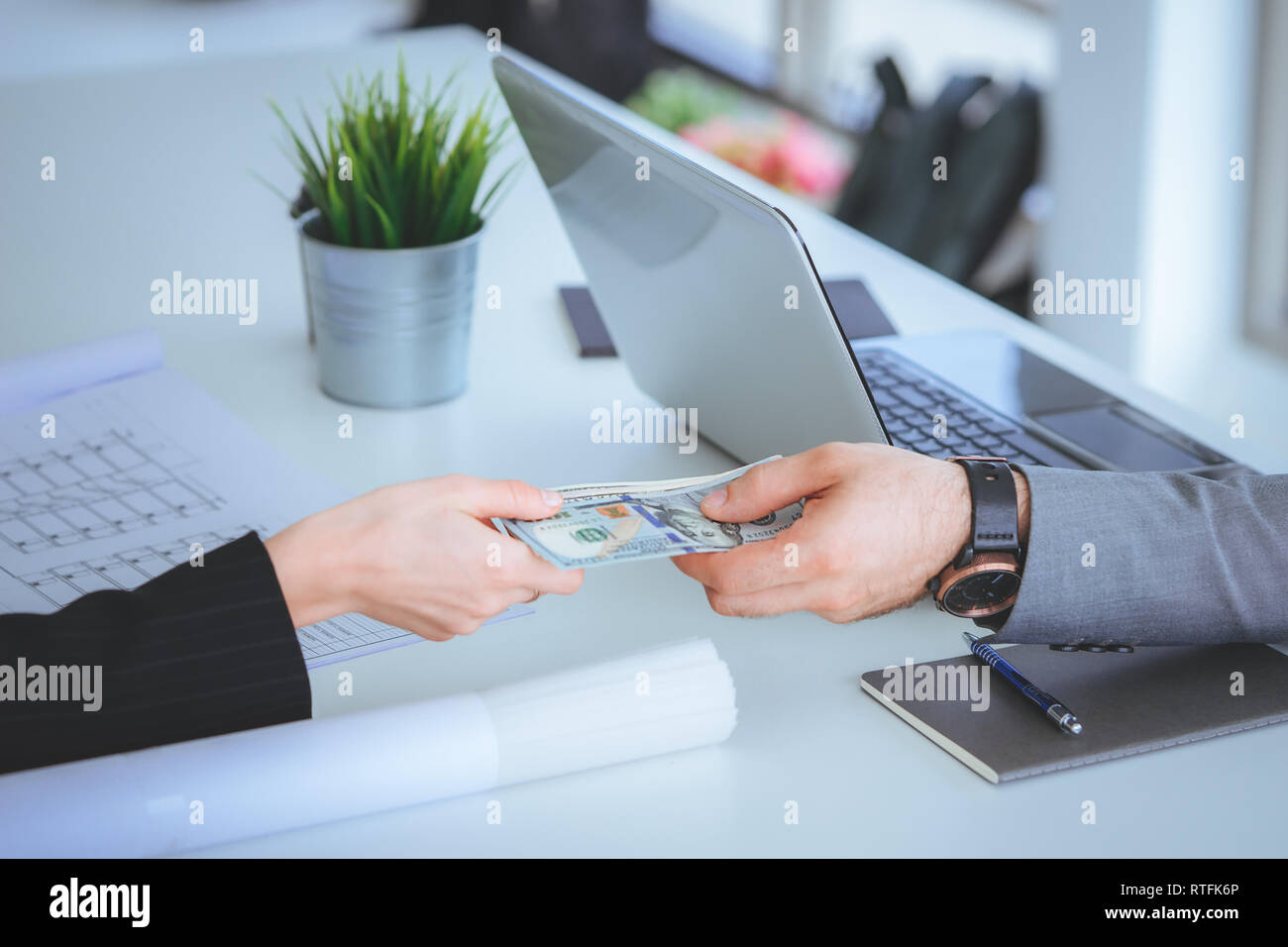 Business man hands handing money over a business dealing Stock Photo ...