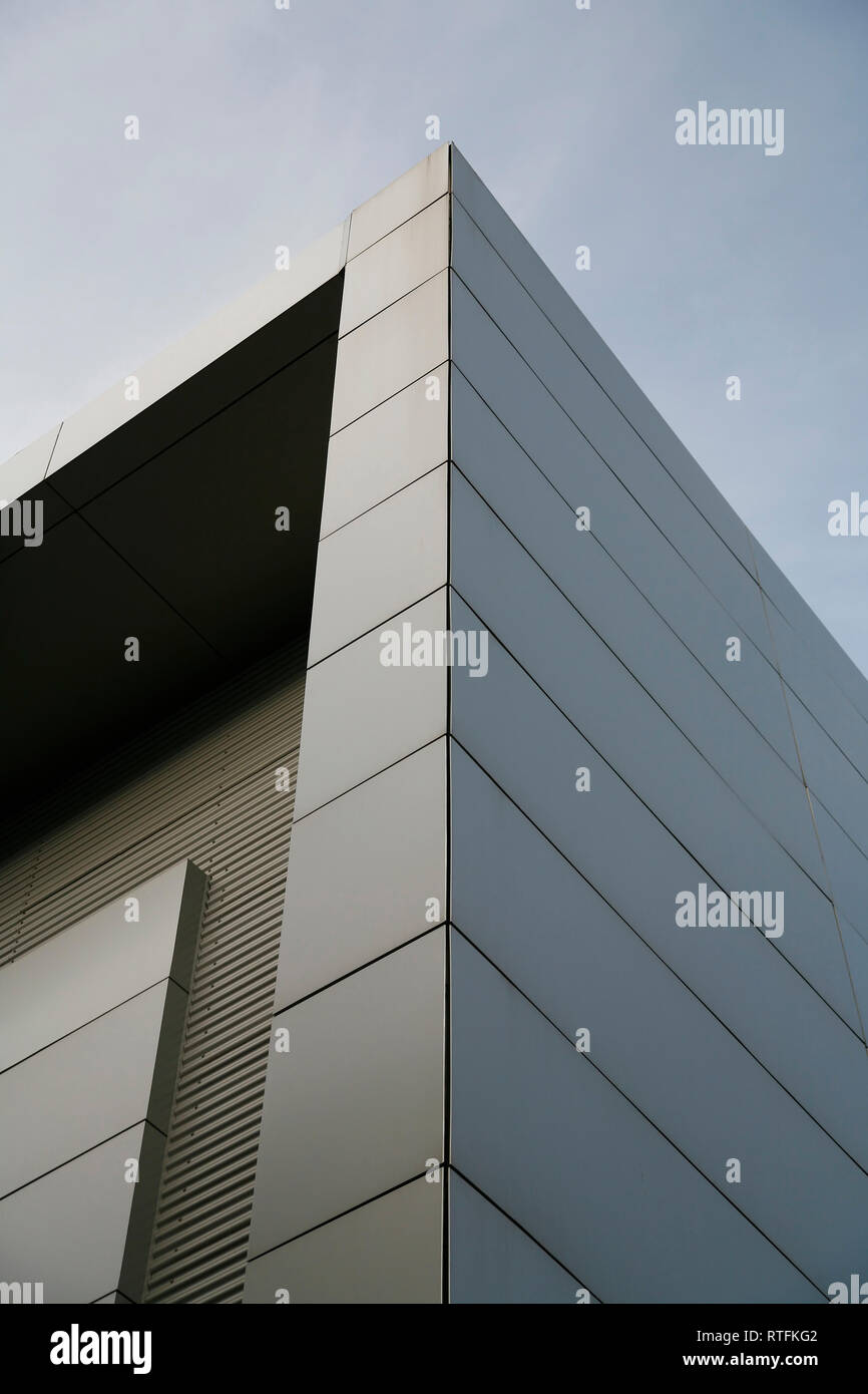 steel wall of modern trade center over the blue sky Stock Photo - Alamy