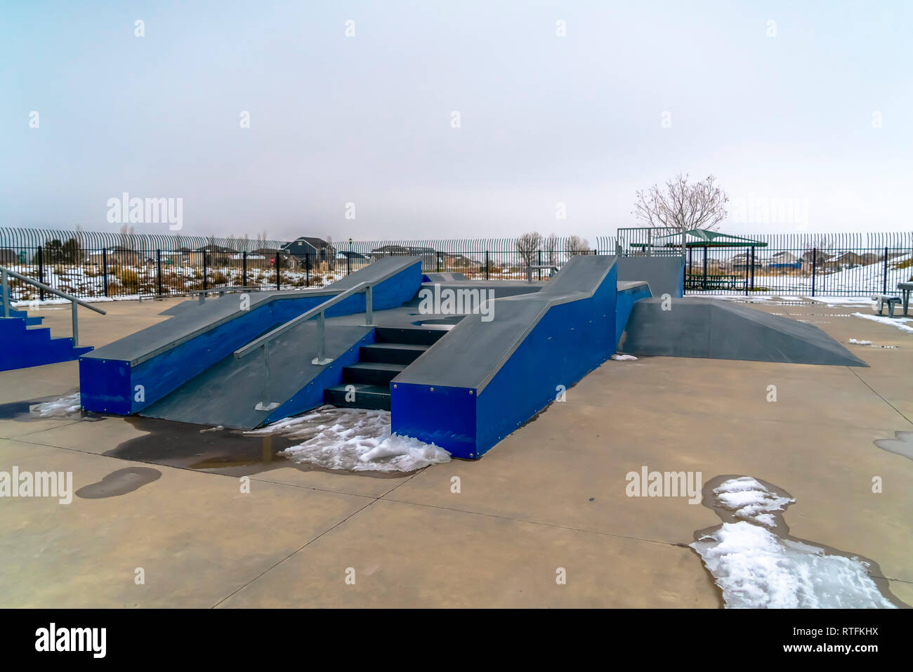 Skateboarding ramp against snowy landscape and sky. Skateboarding ramp ...