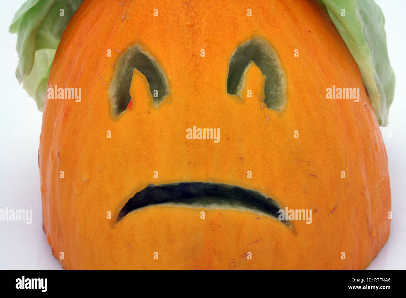 sad melon with salad Stock Photo - Alamy